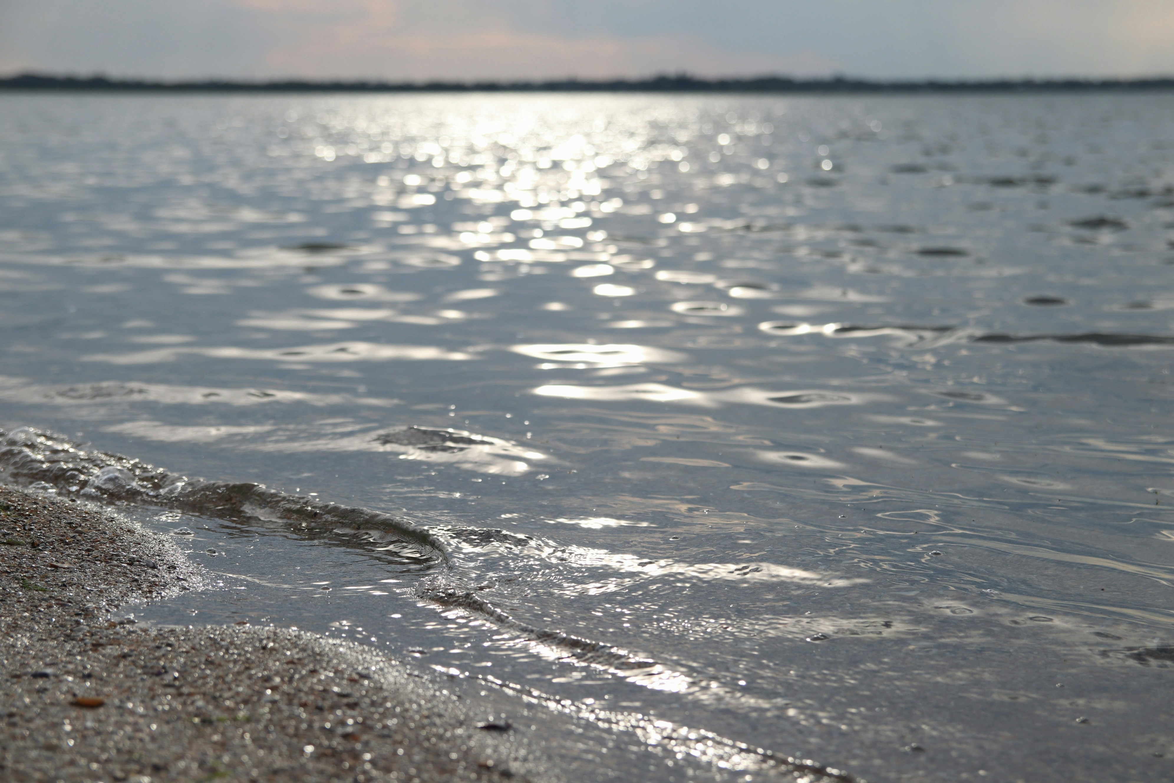 Diamond Light on Pebble Shoreline at Sunset