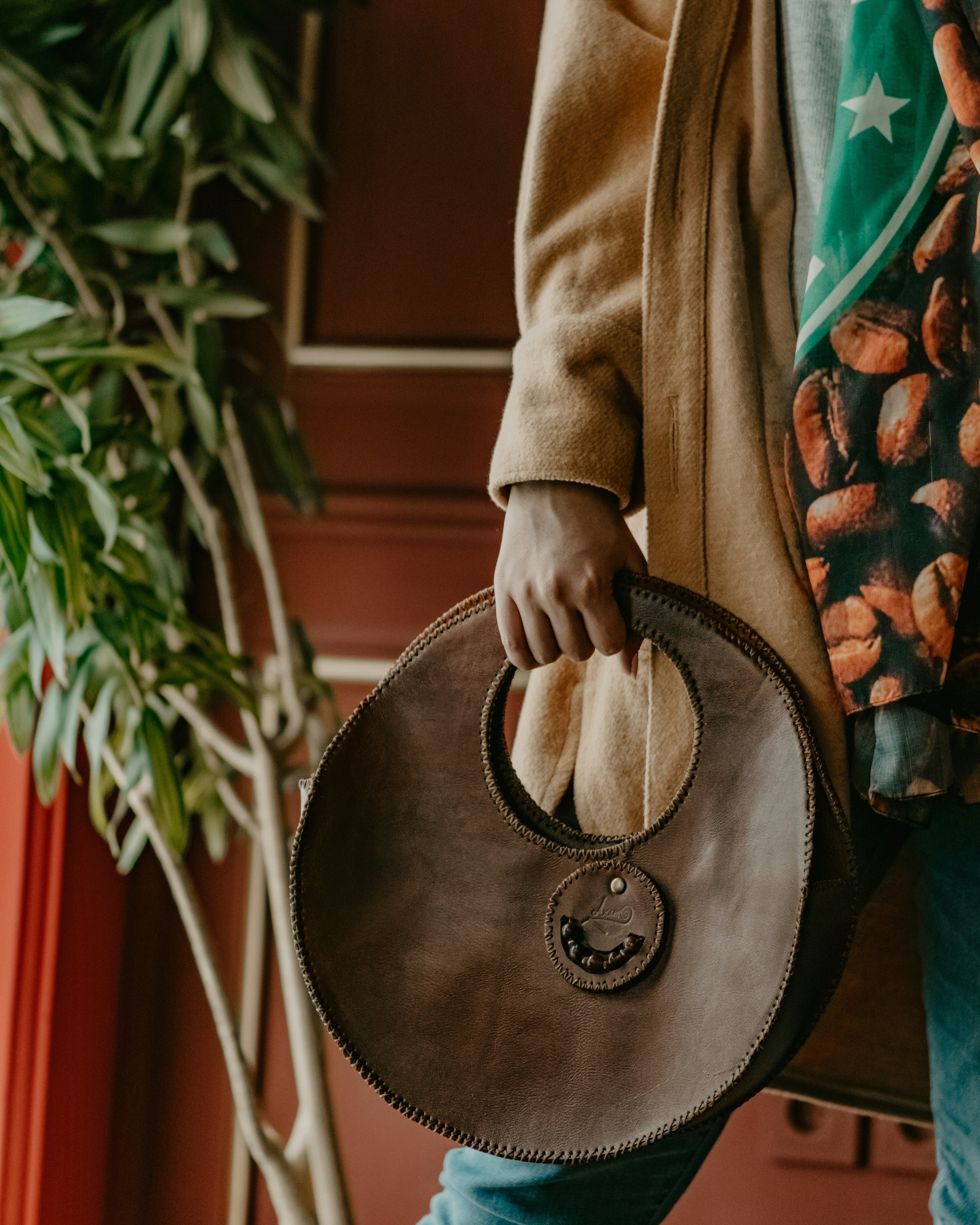 Round Leather Tote at the Doorstep: A Quiet Textural Moment
