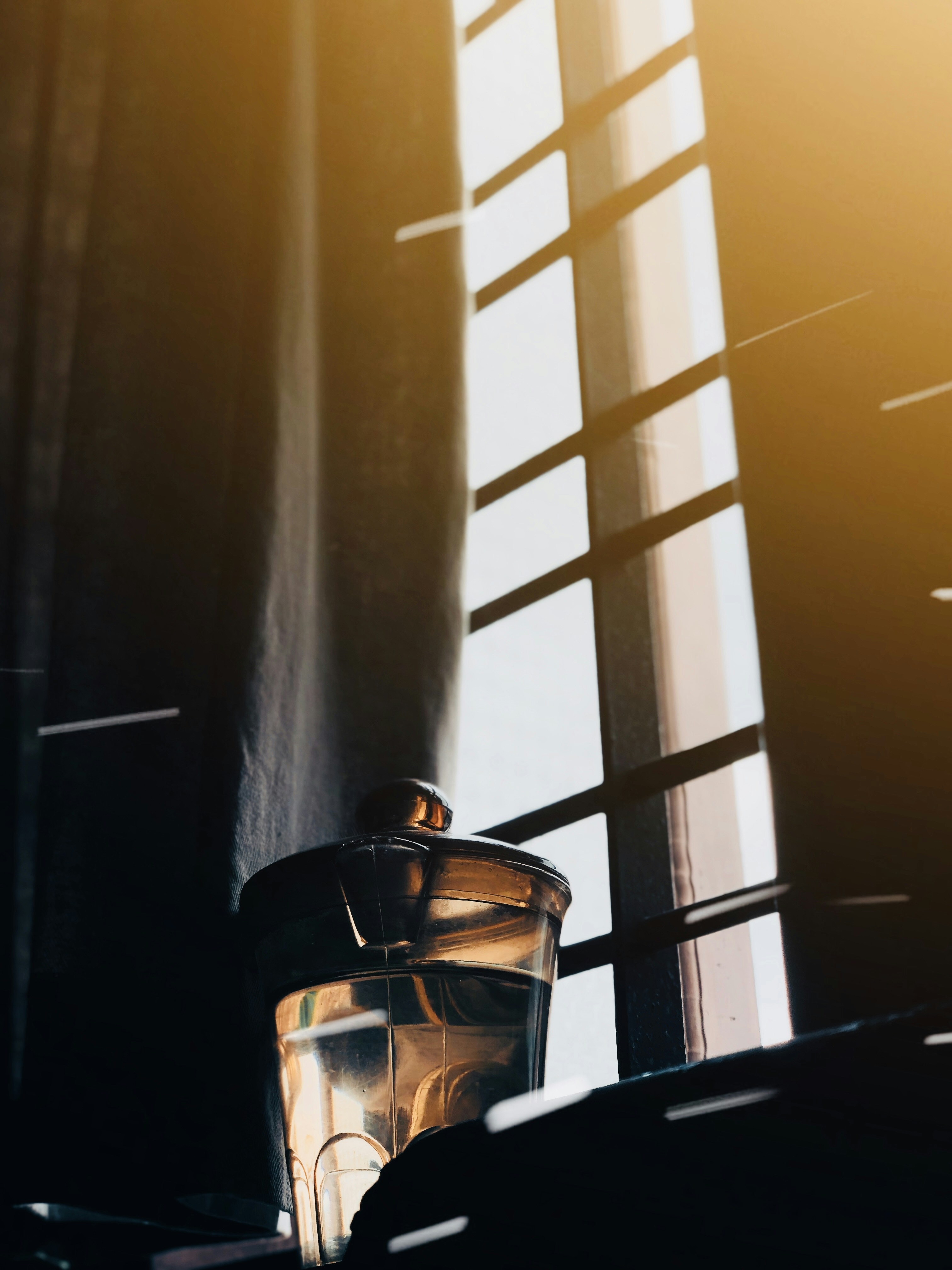 Clear glass mug near window photo – Free Building Image on Unsplash