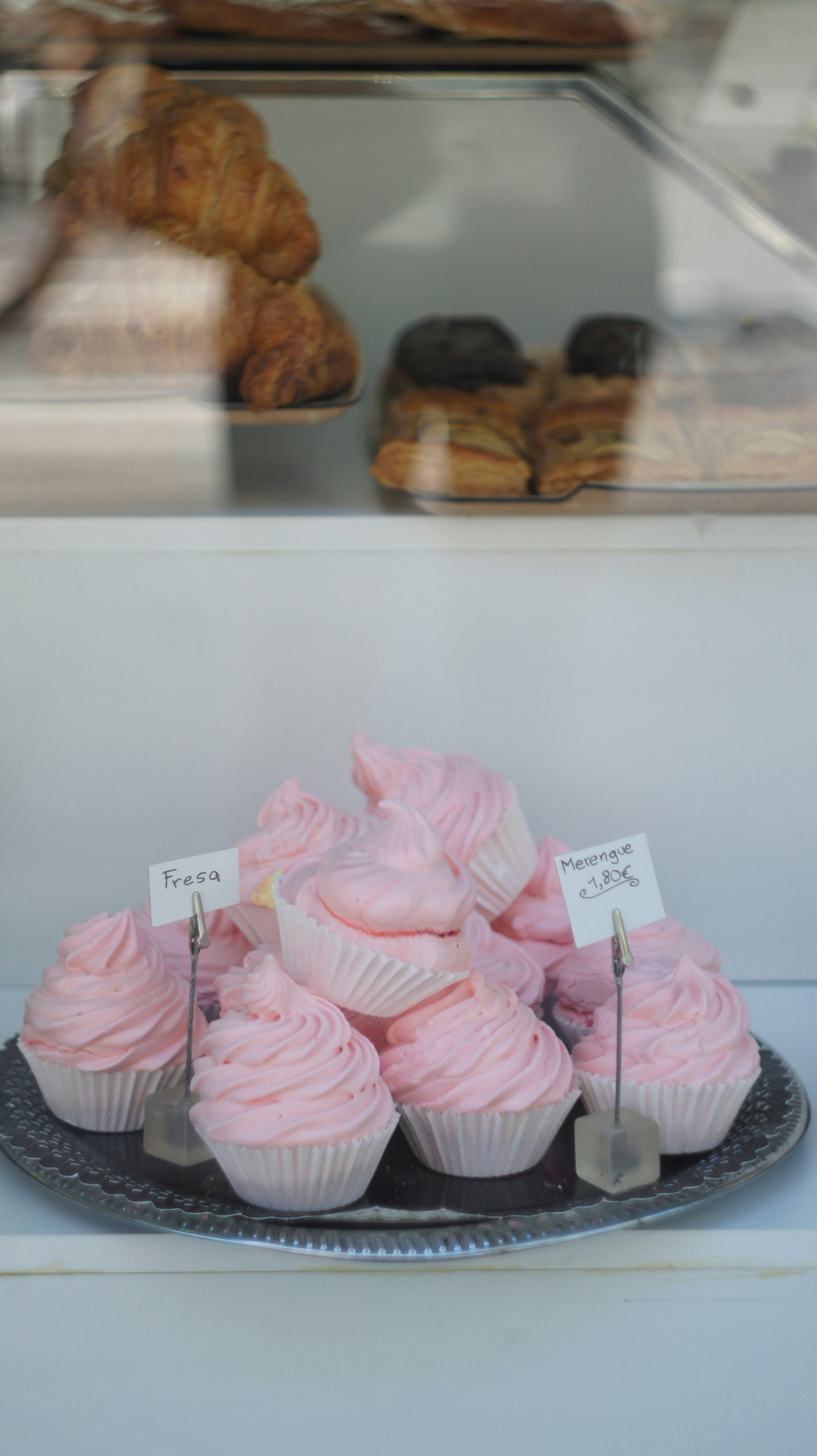 Pink Cupcake Parade in a Pastry Shop Window