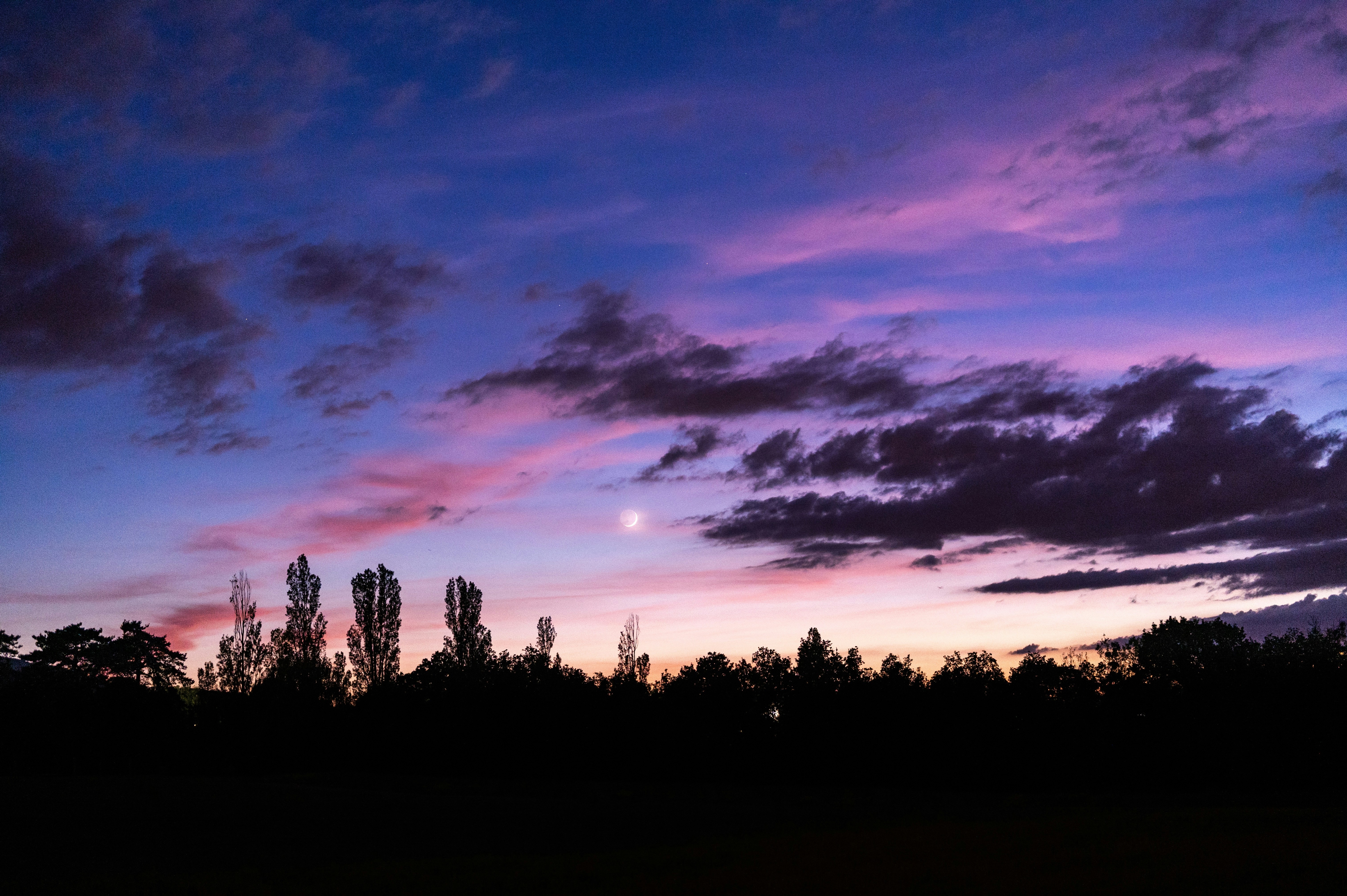 Violet Crest at Dusk: Twilight Sky Drapes a Quiet Horizon