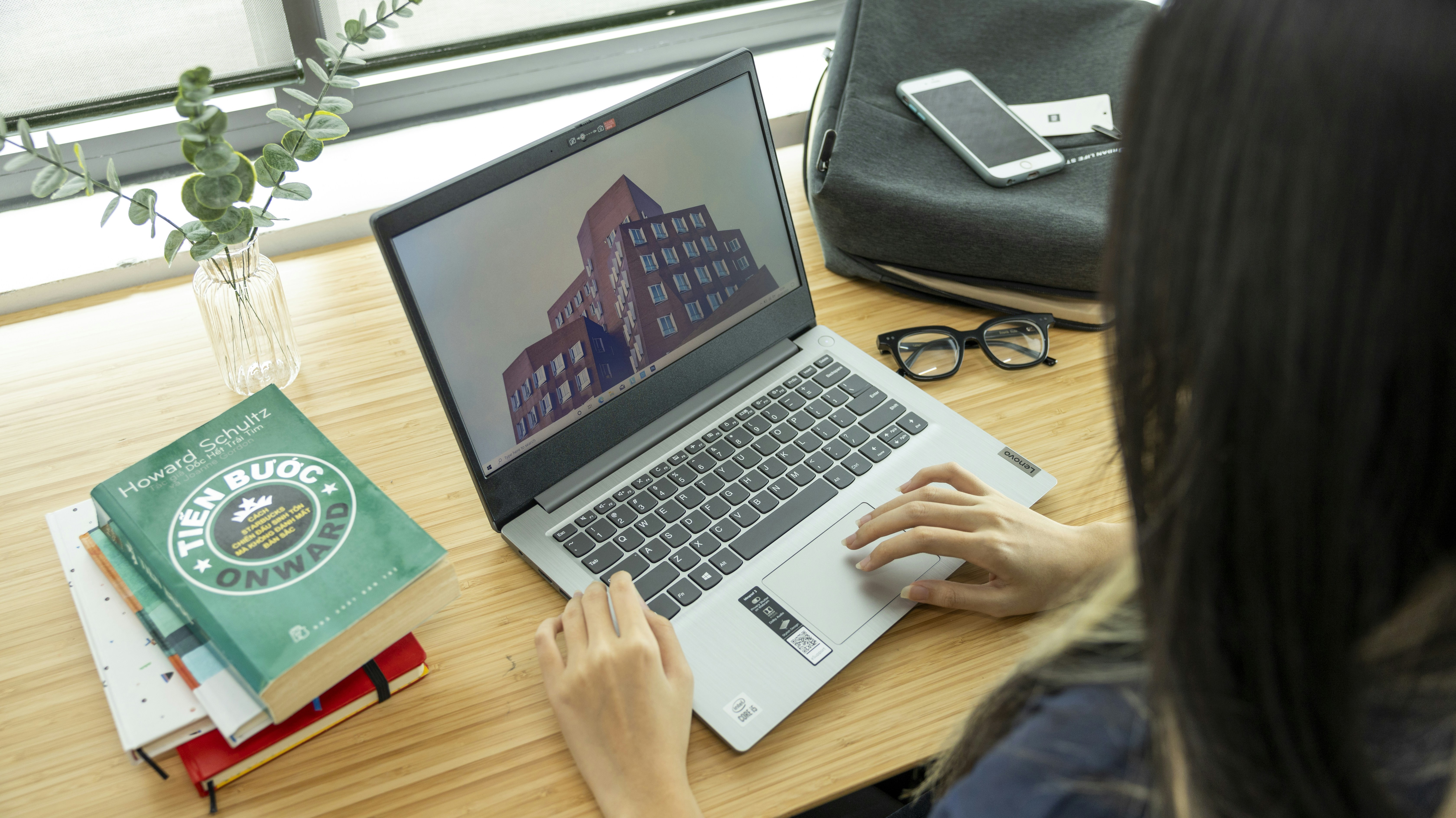 Person using macbook pro on brown wooden table photo – Free Usa Image ...