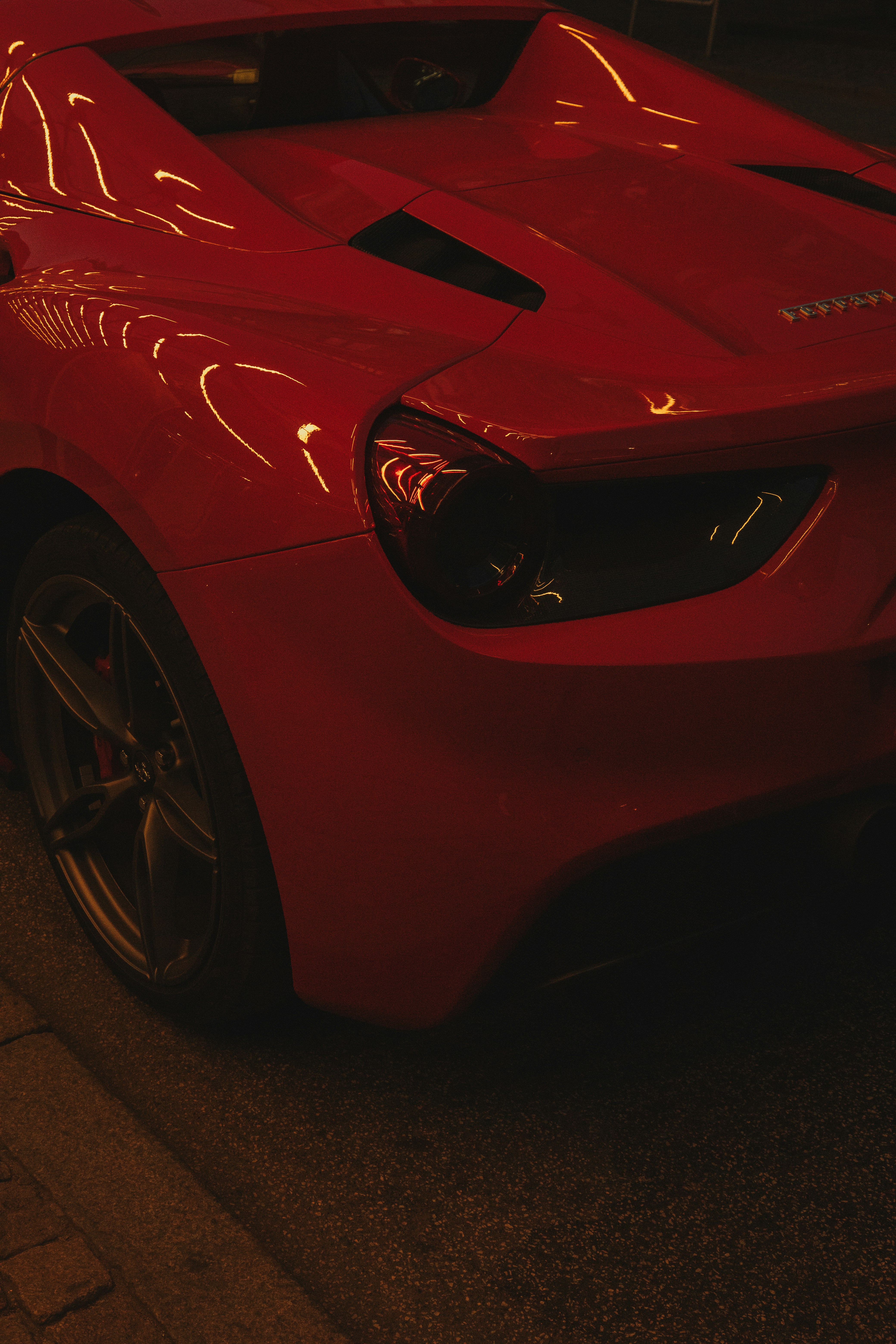 red ferrari 458 italia on road