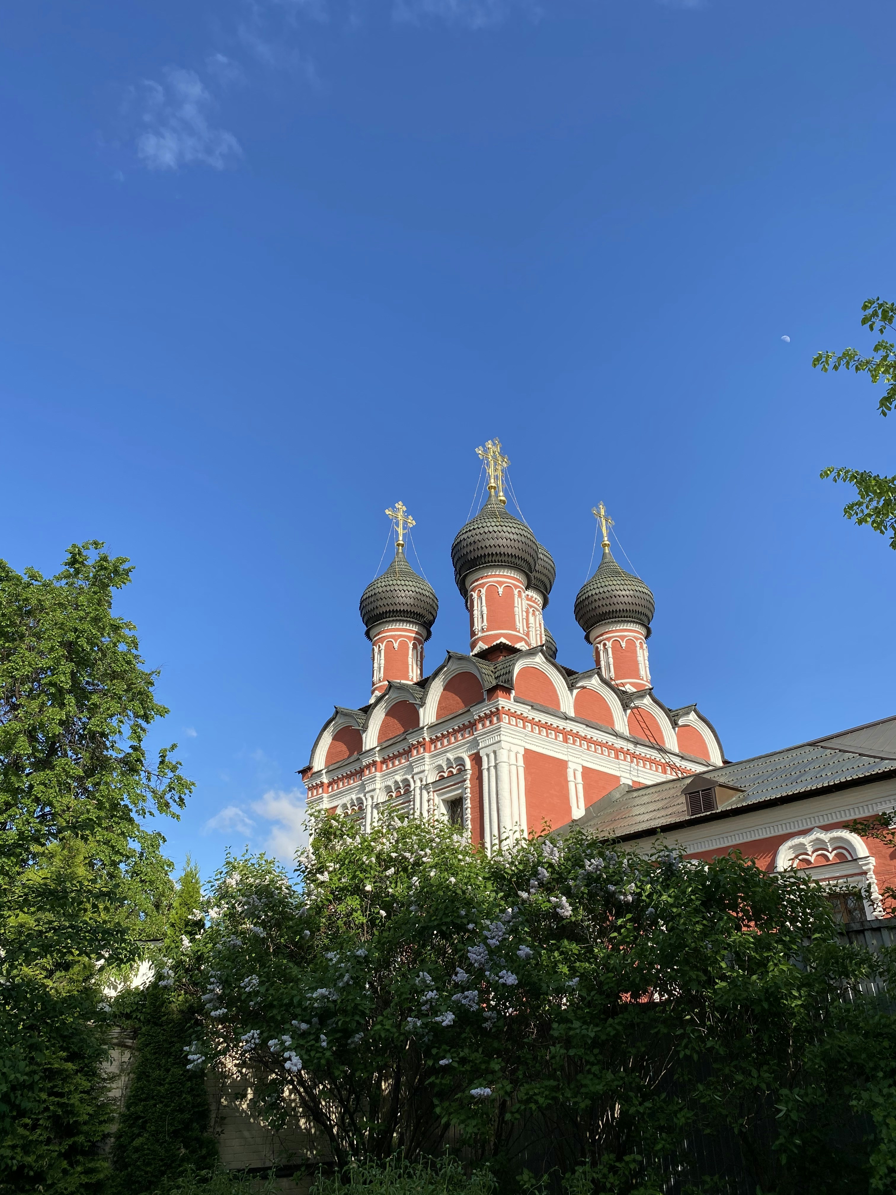 Church  | brown and white concrete building under blue sky during daytime