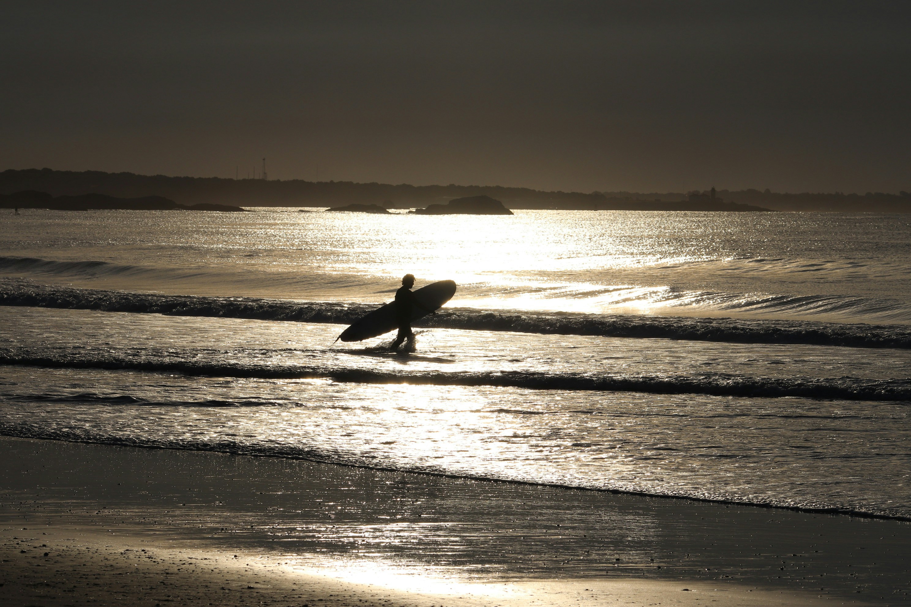 Silhouette Surfer at Dawn's Edge