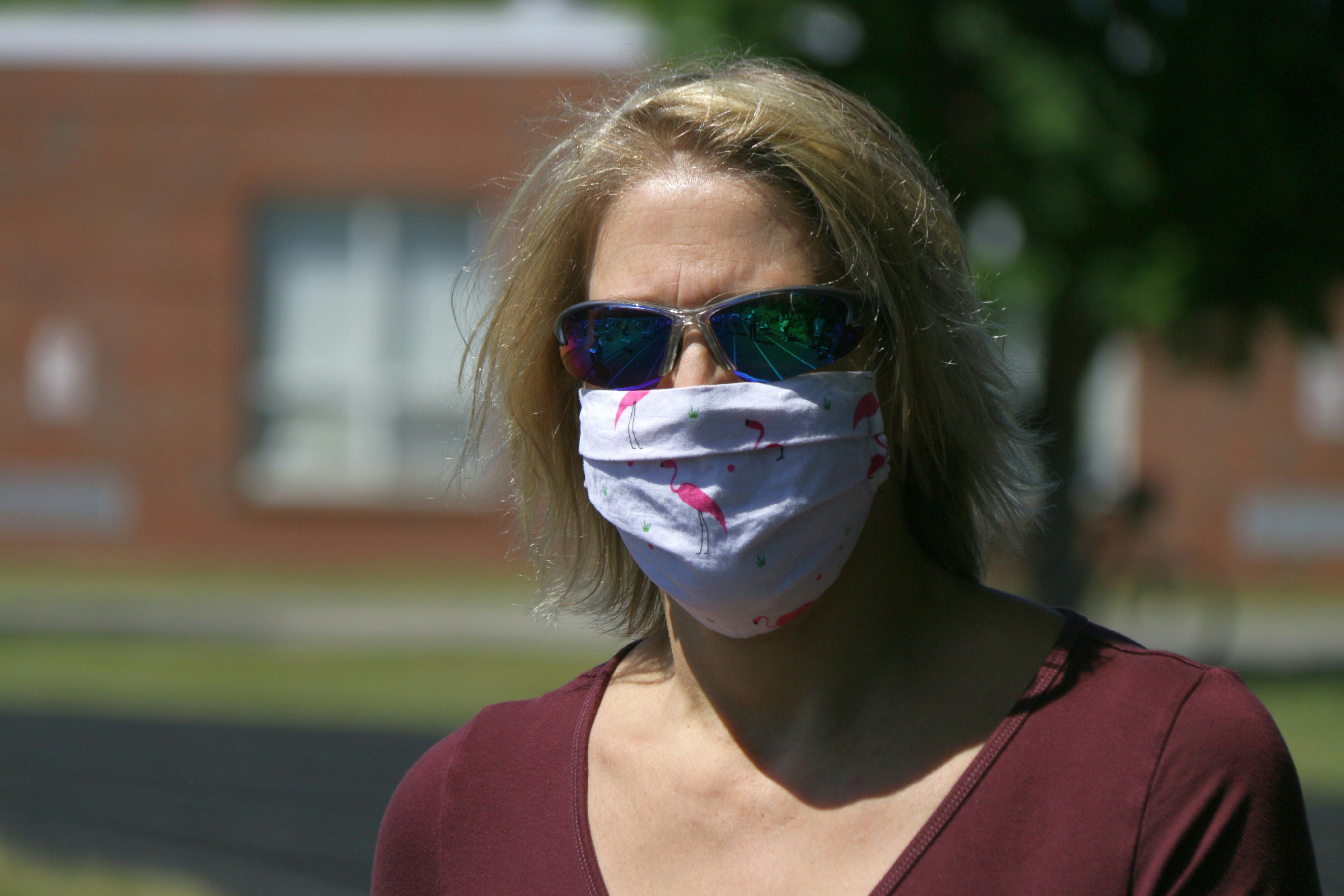 Sunlit Resilience: A Masked Moment in Quiet Light