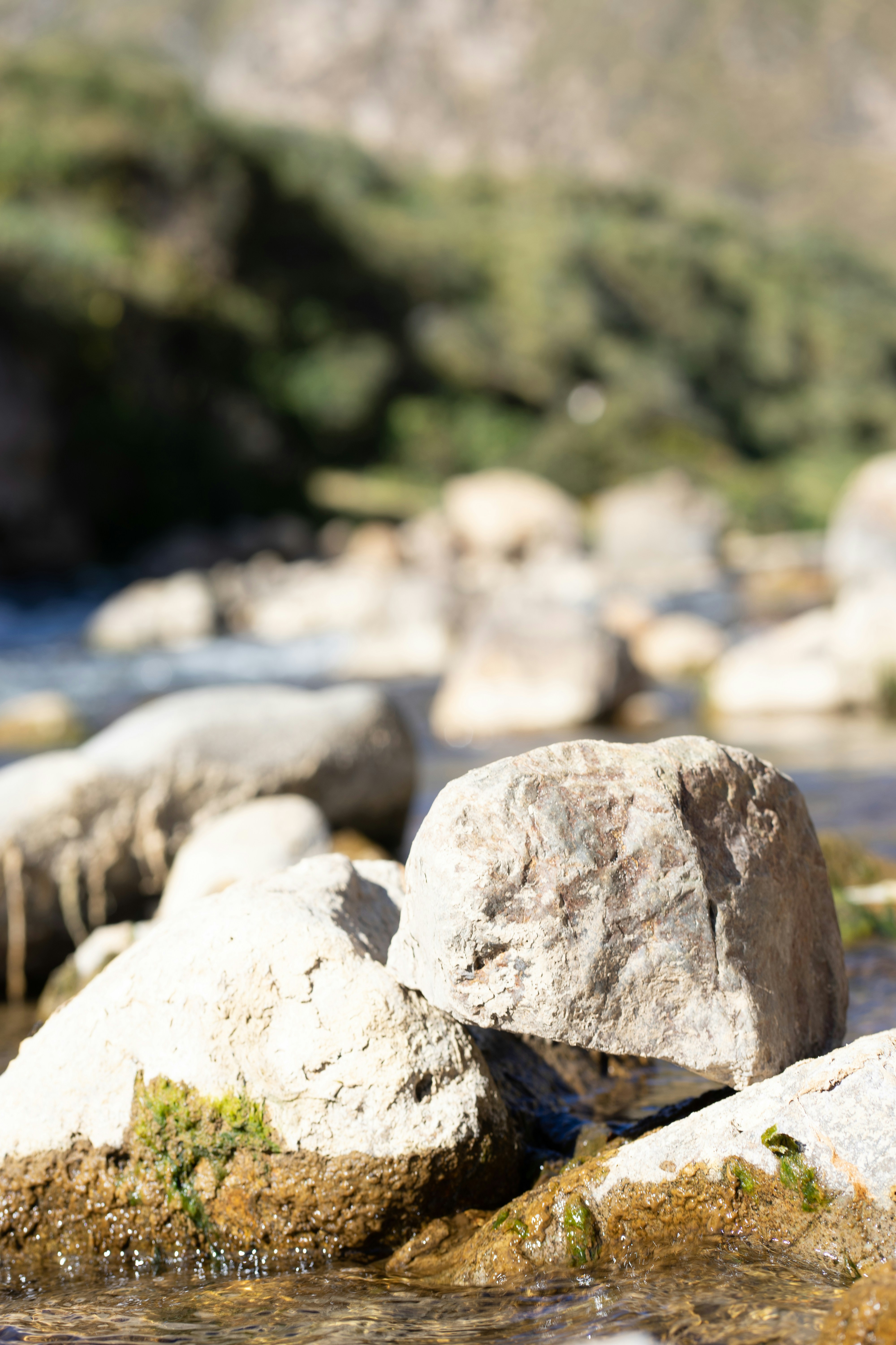 Gray and white stone near body of water during daytime photo – Free ...