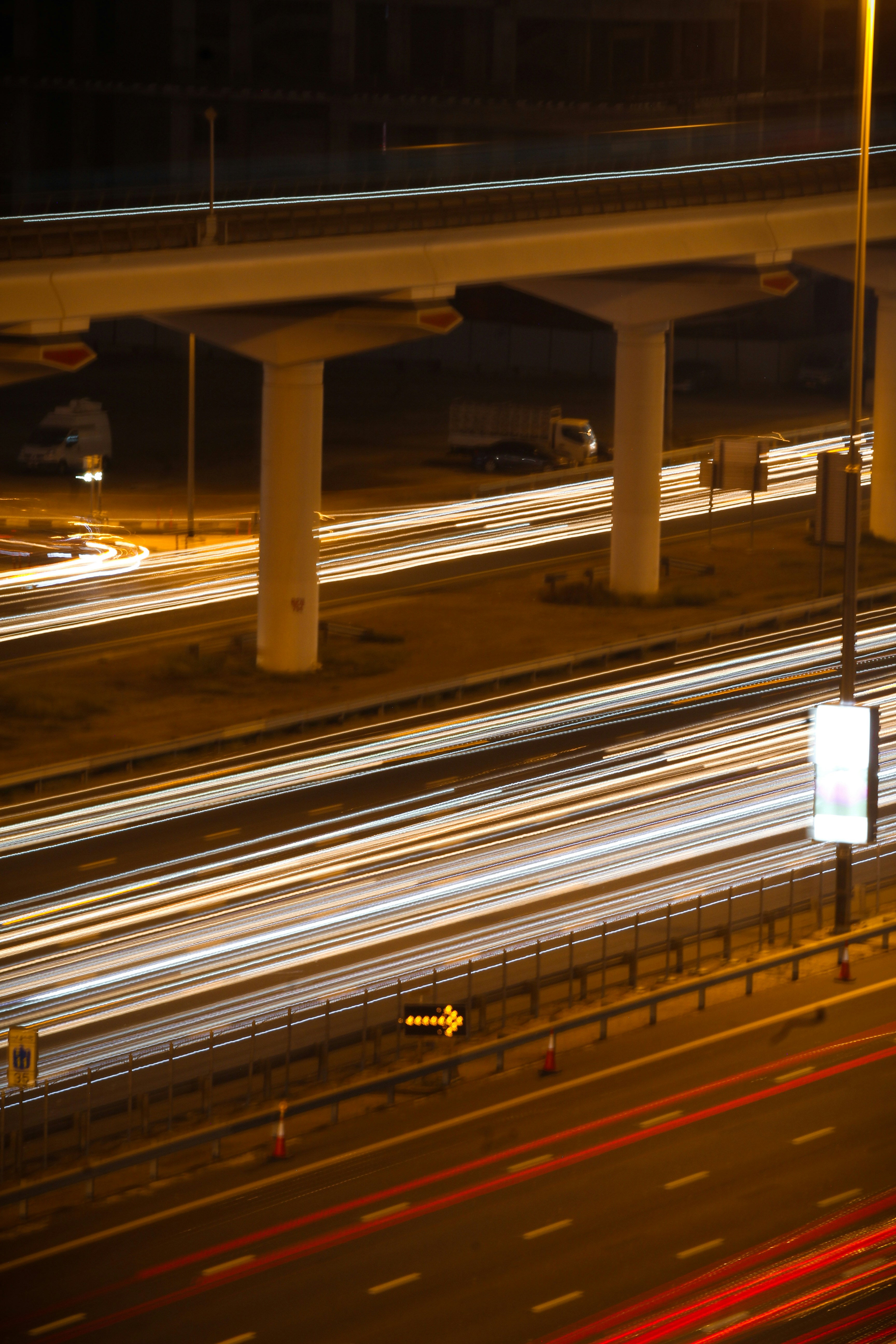 Underpass Night Pulse: Long-Exposure Streams of City Light