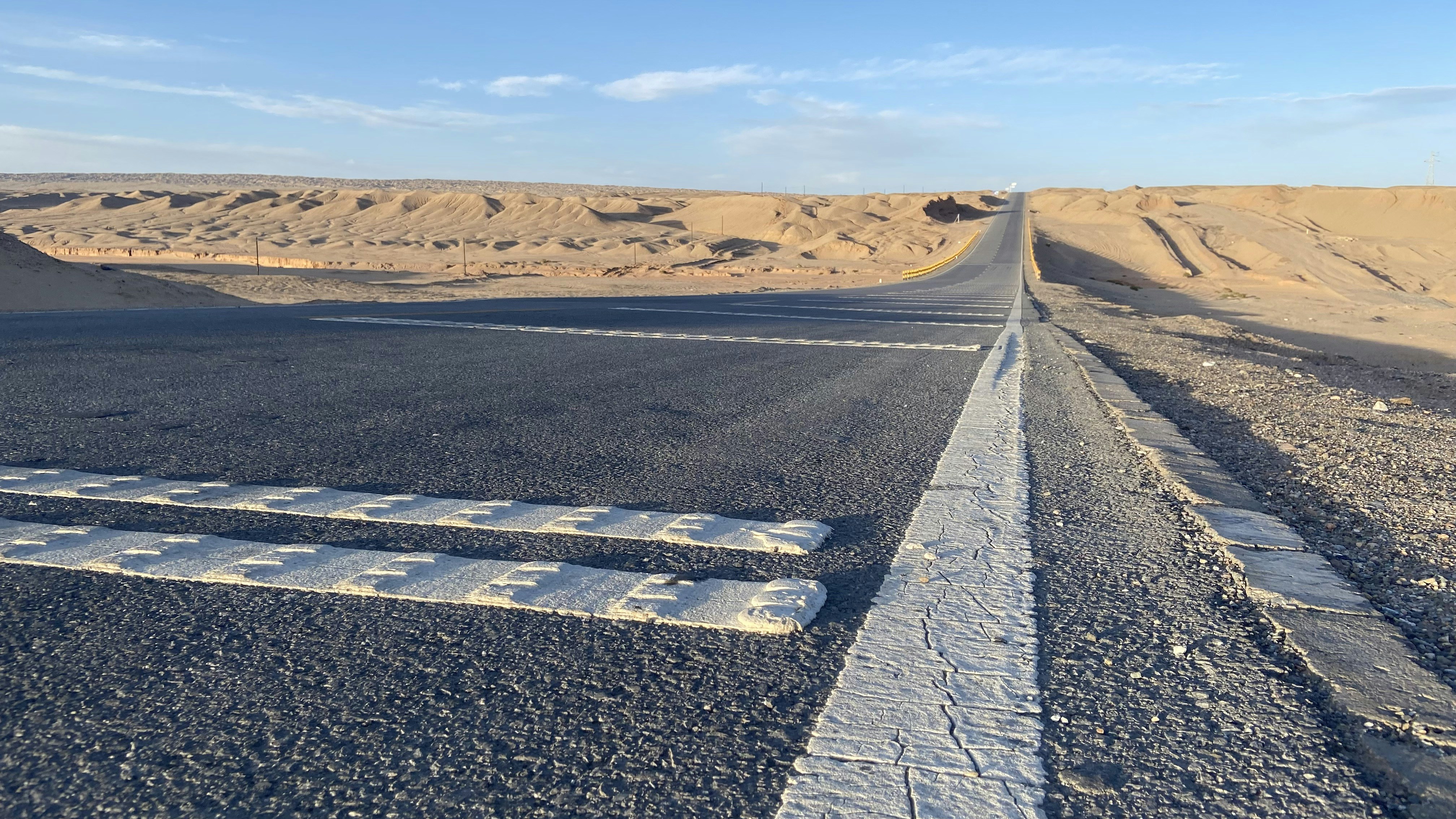 gray concrete road during daytime