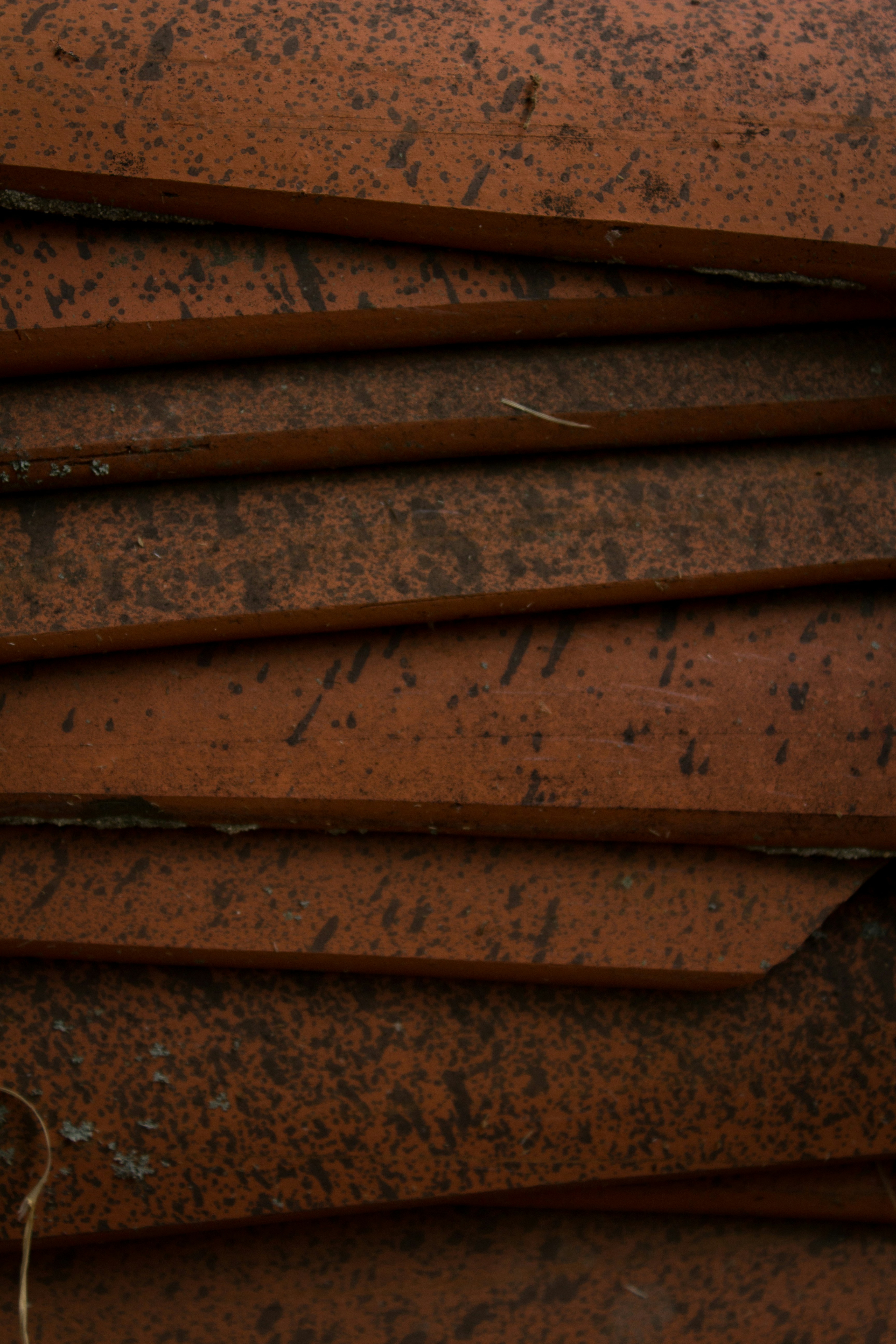 Rust and Residue: Weathered Metal Layers Streaked with Time
