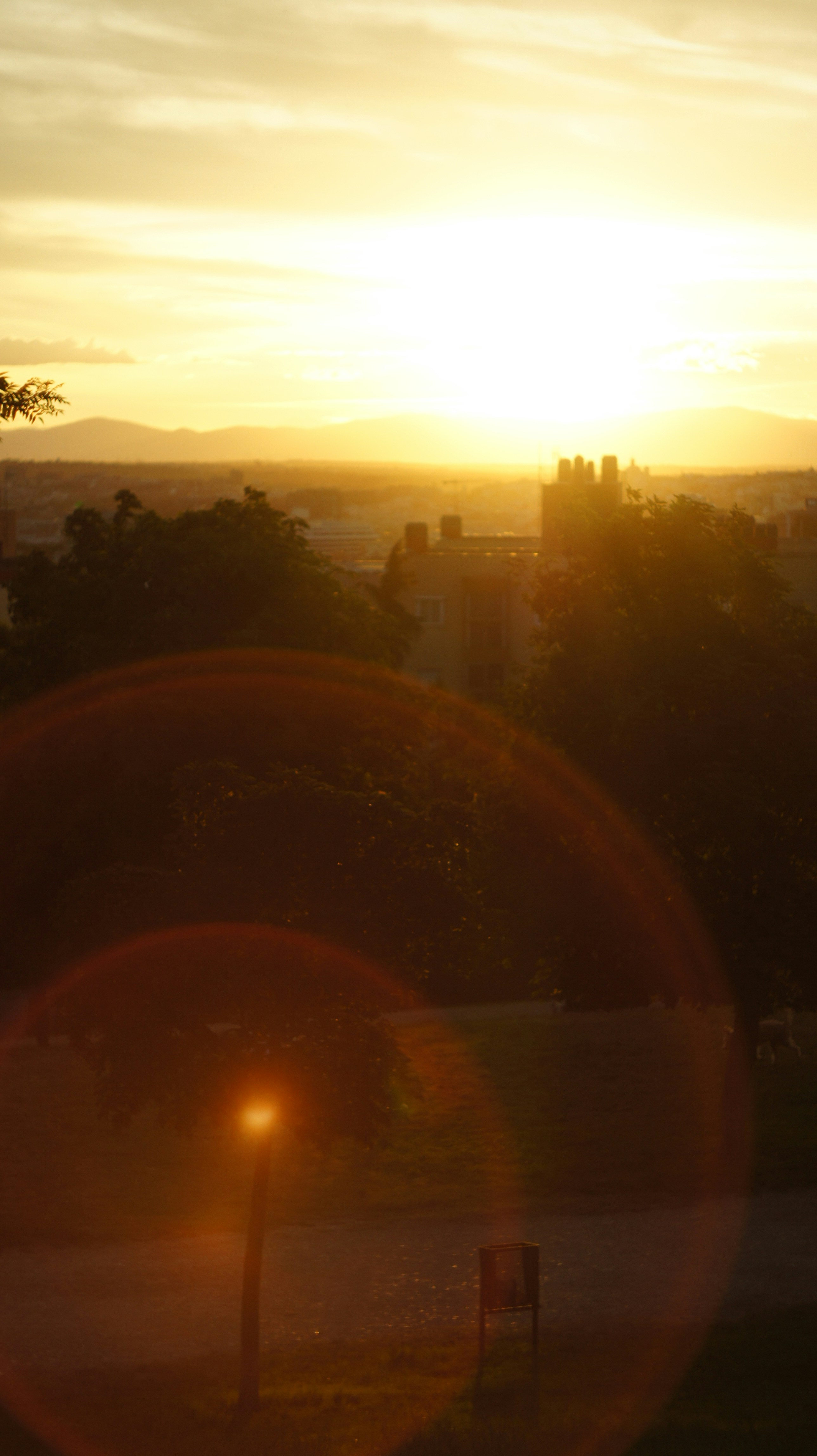 Sunset Halo Over a Sleeping City