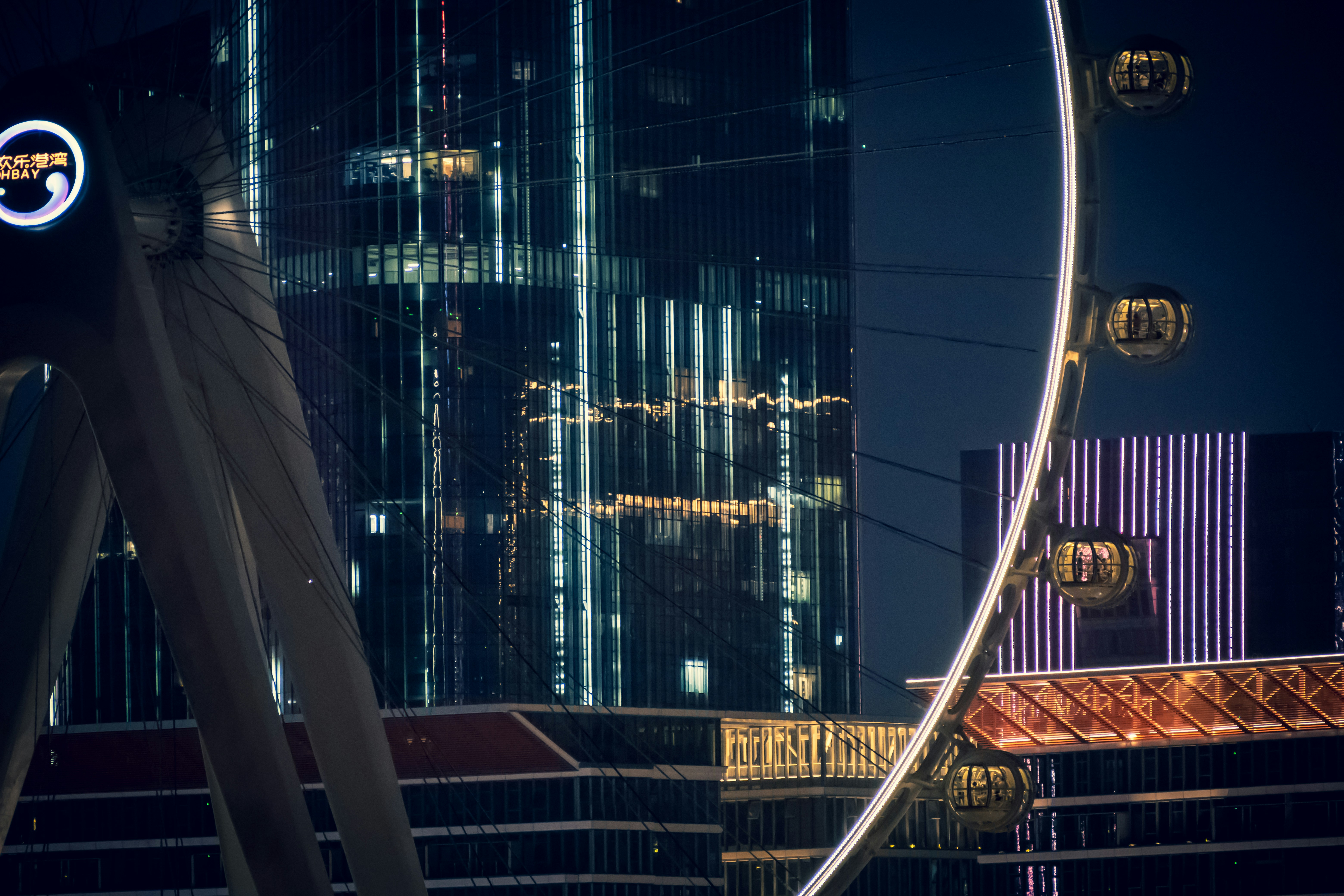 blue and brown high rise building during nighttime