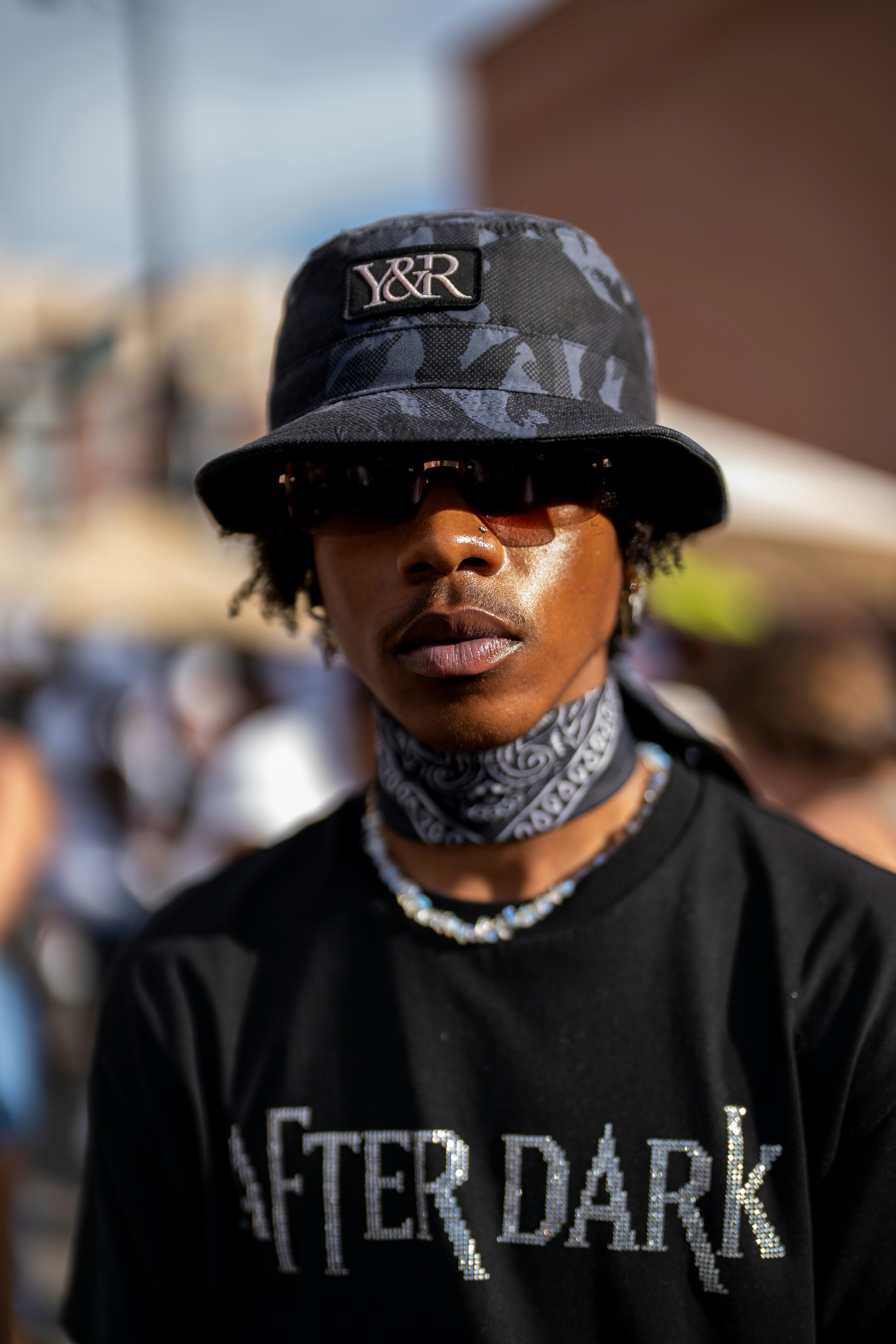 Shadowed Portrait in a Sunlit Street