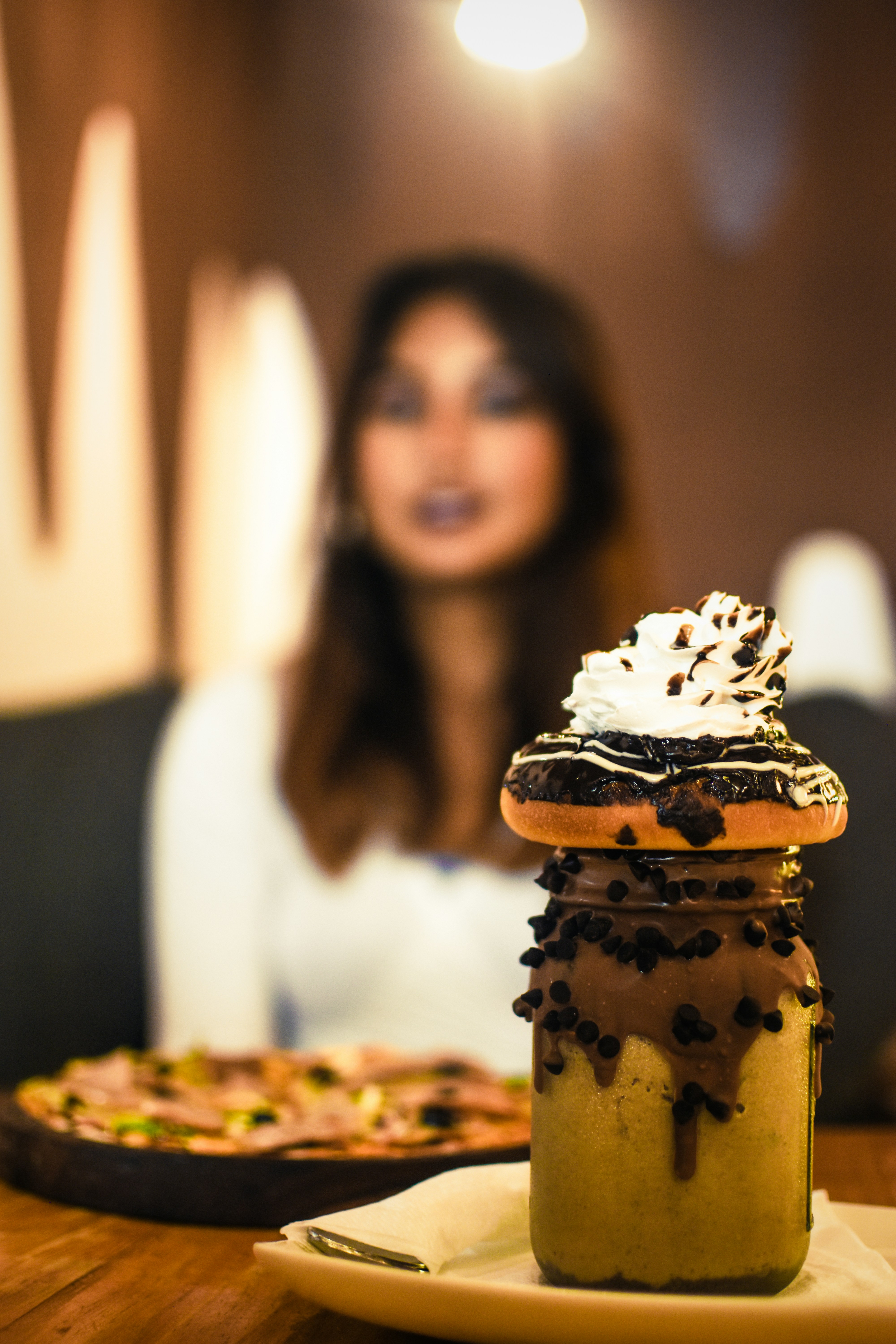 Brown and black cupcake with chocolate and chocolate syrup photo – Free ...