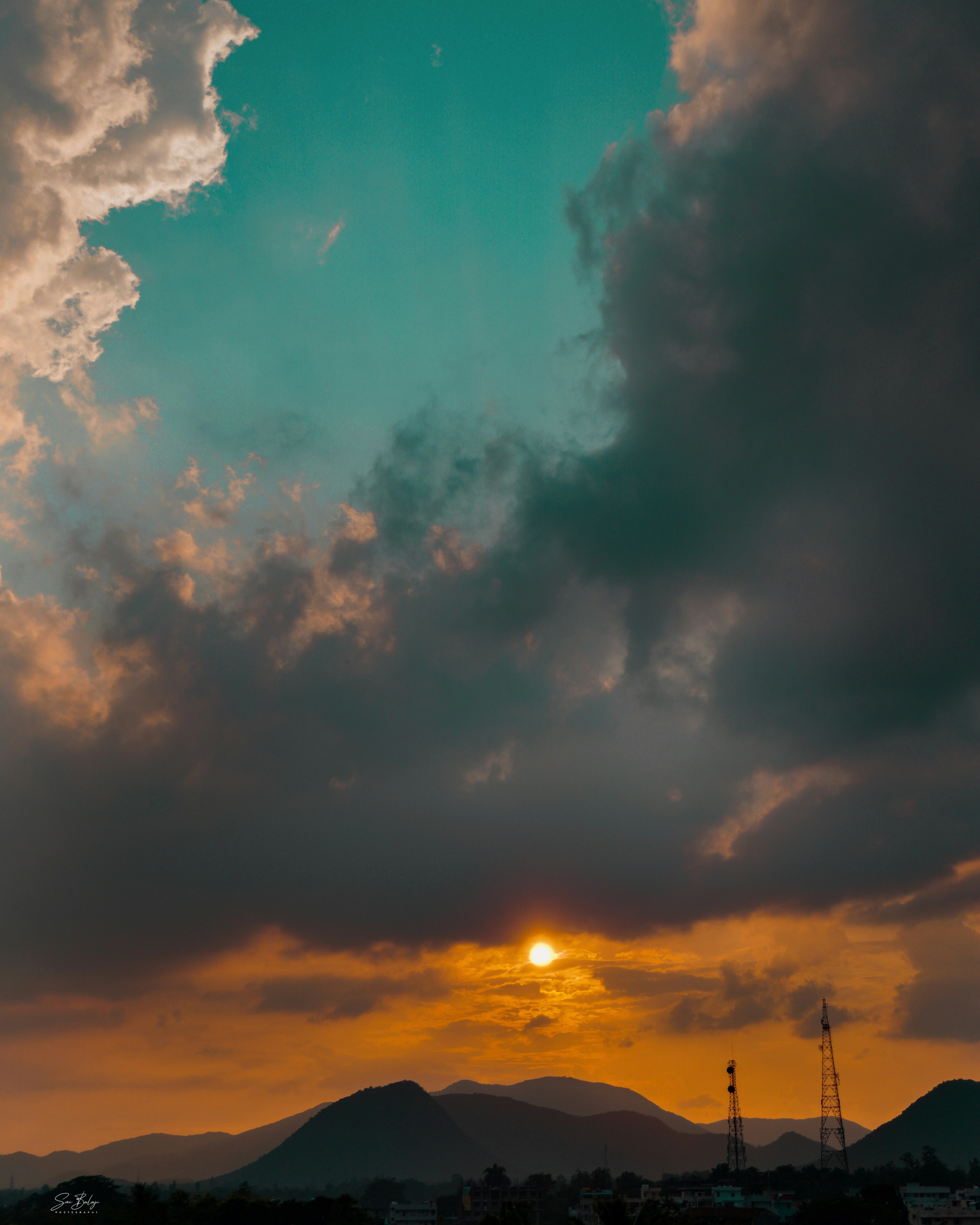 Ember Over the Silent Ridge: Teal Sky at Dusk