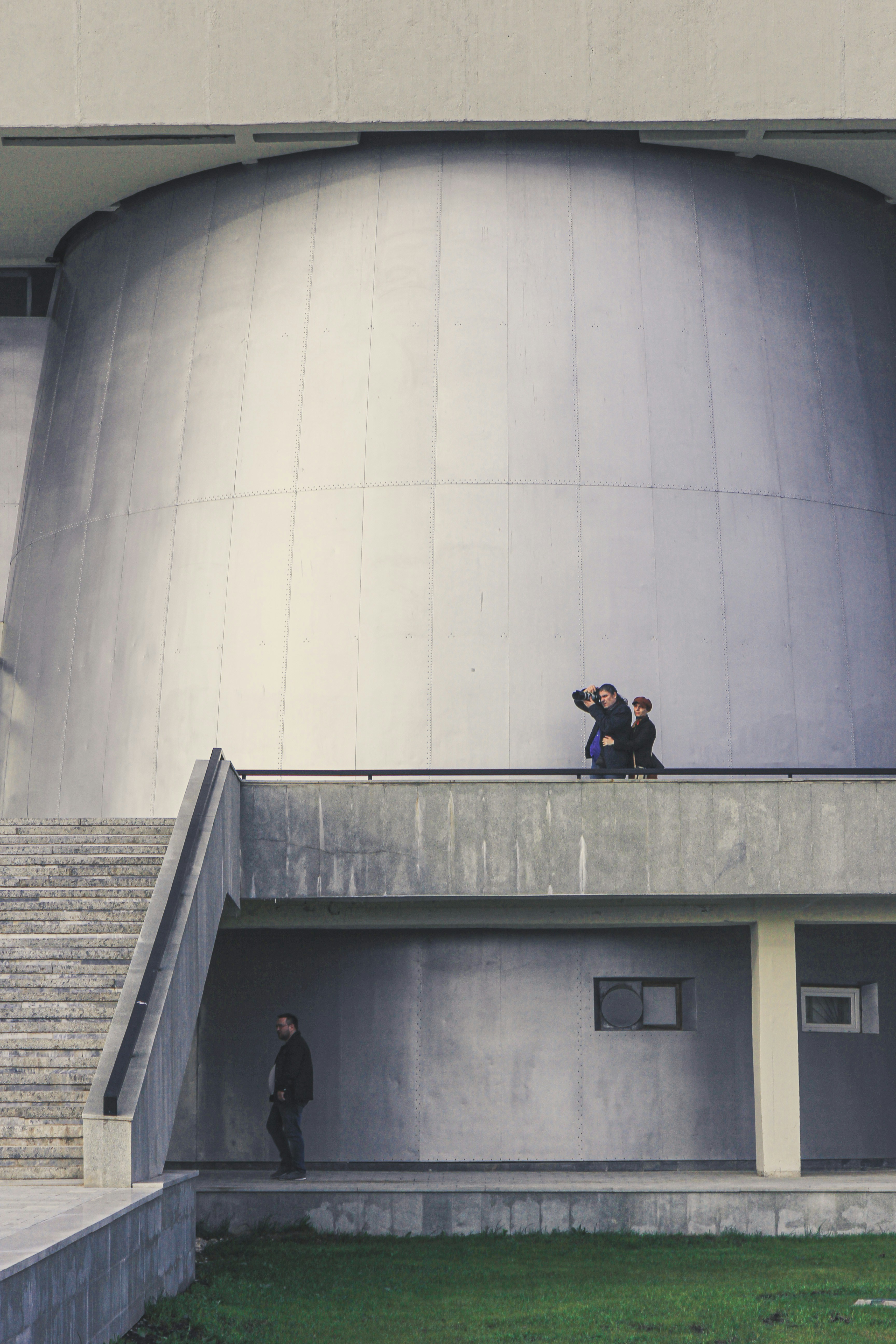 Man in black jacket sitting on gray concrete stairs photo – Free Kaluga ...