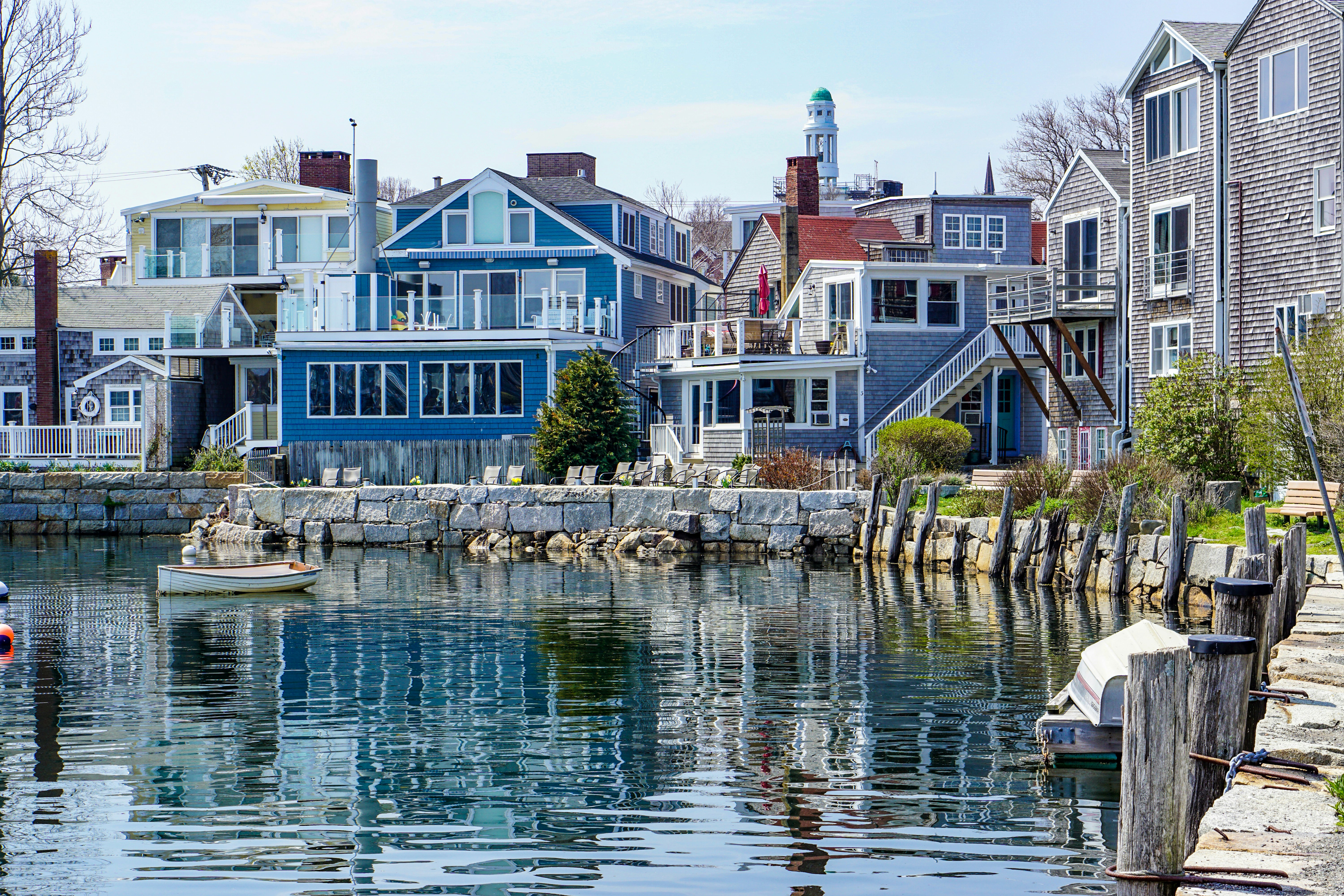 Azure Harbor Row: Calm Water and Blue Coastal Homes