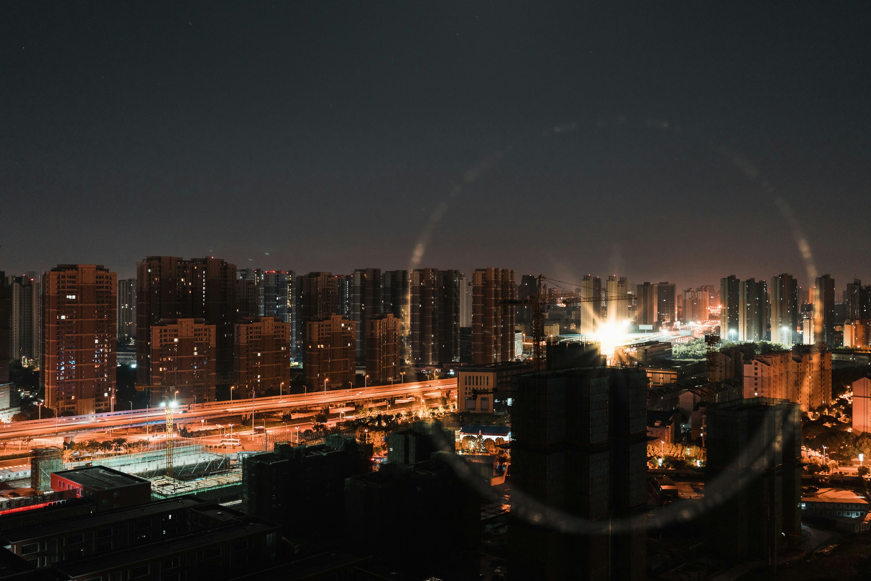 City with high rise buildings during night time photo – Free Outdoors ...