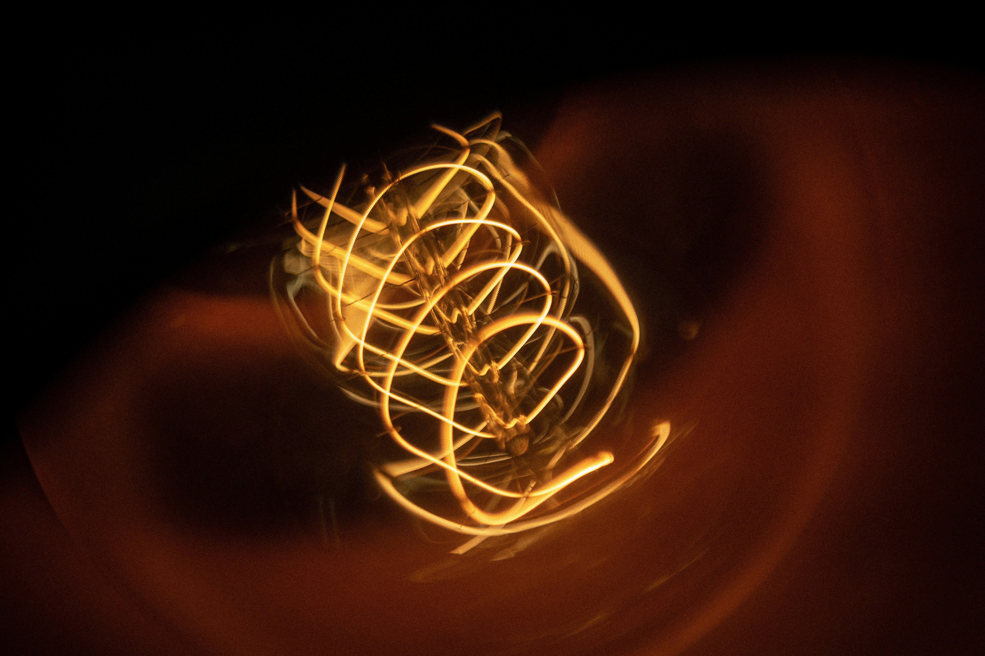 Edison Spiral in the Dark: Ember of a Long-Exposure Filament