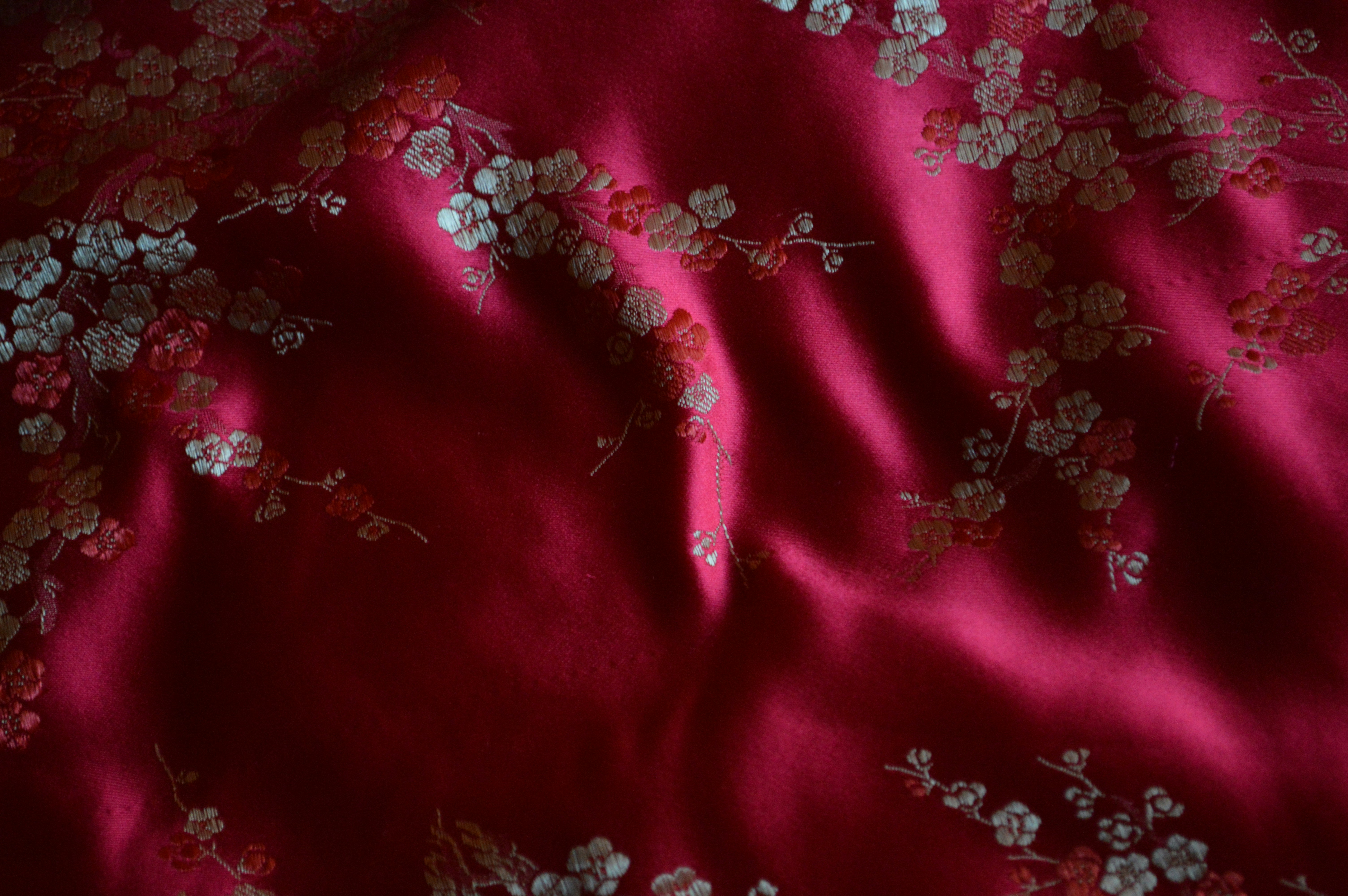 Silken Waves of Crimson and Blossom