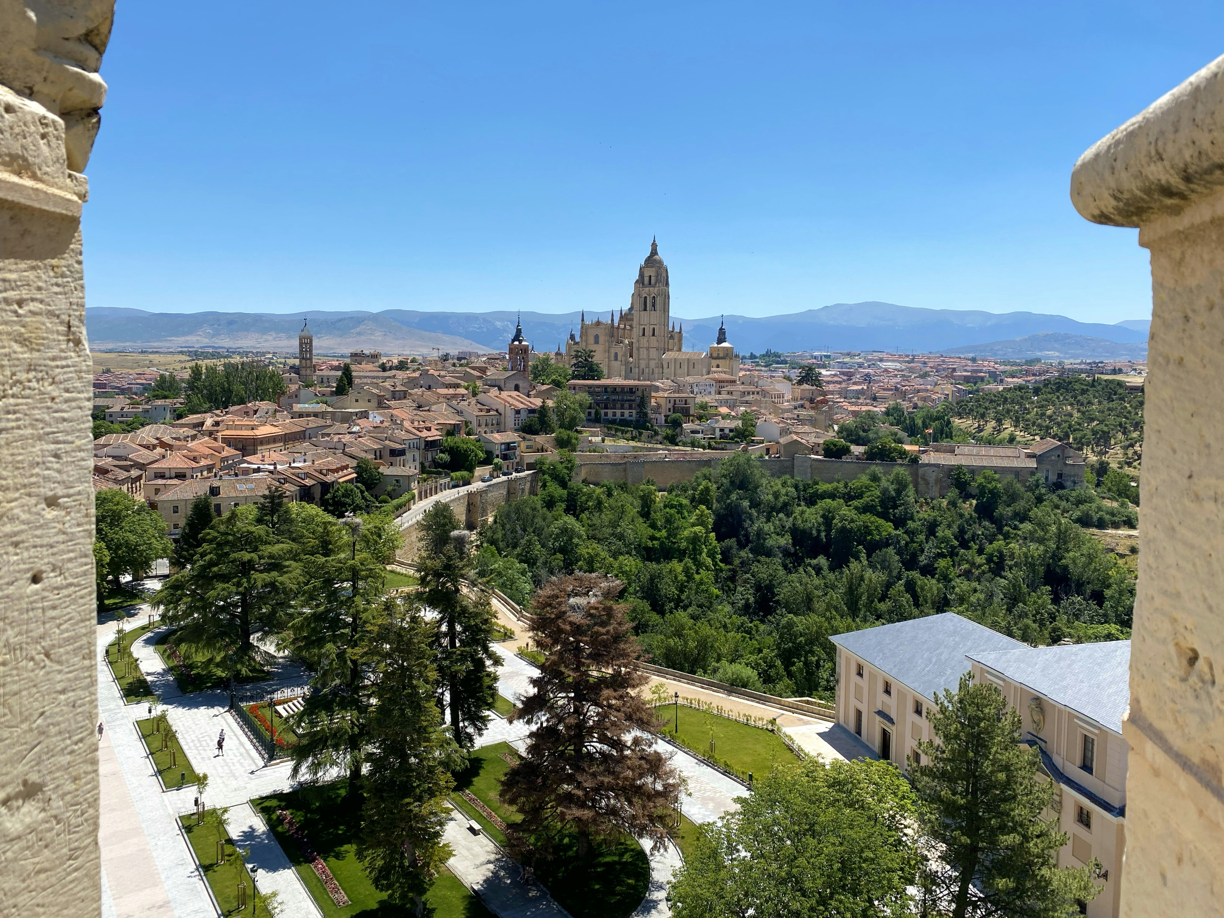 Fantastic view of Segovia from the Alcázar. | green trees and brown concrete building during daytime