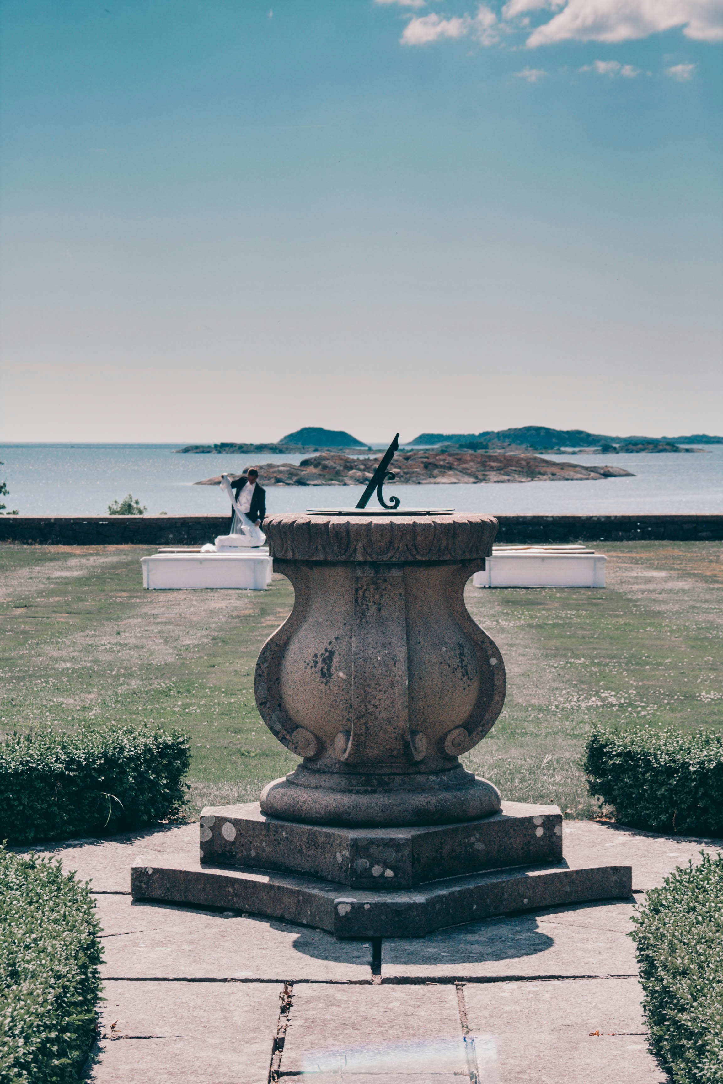 Stone Pedestal by the Sea: A Quiet Ceremony on the Horizon