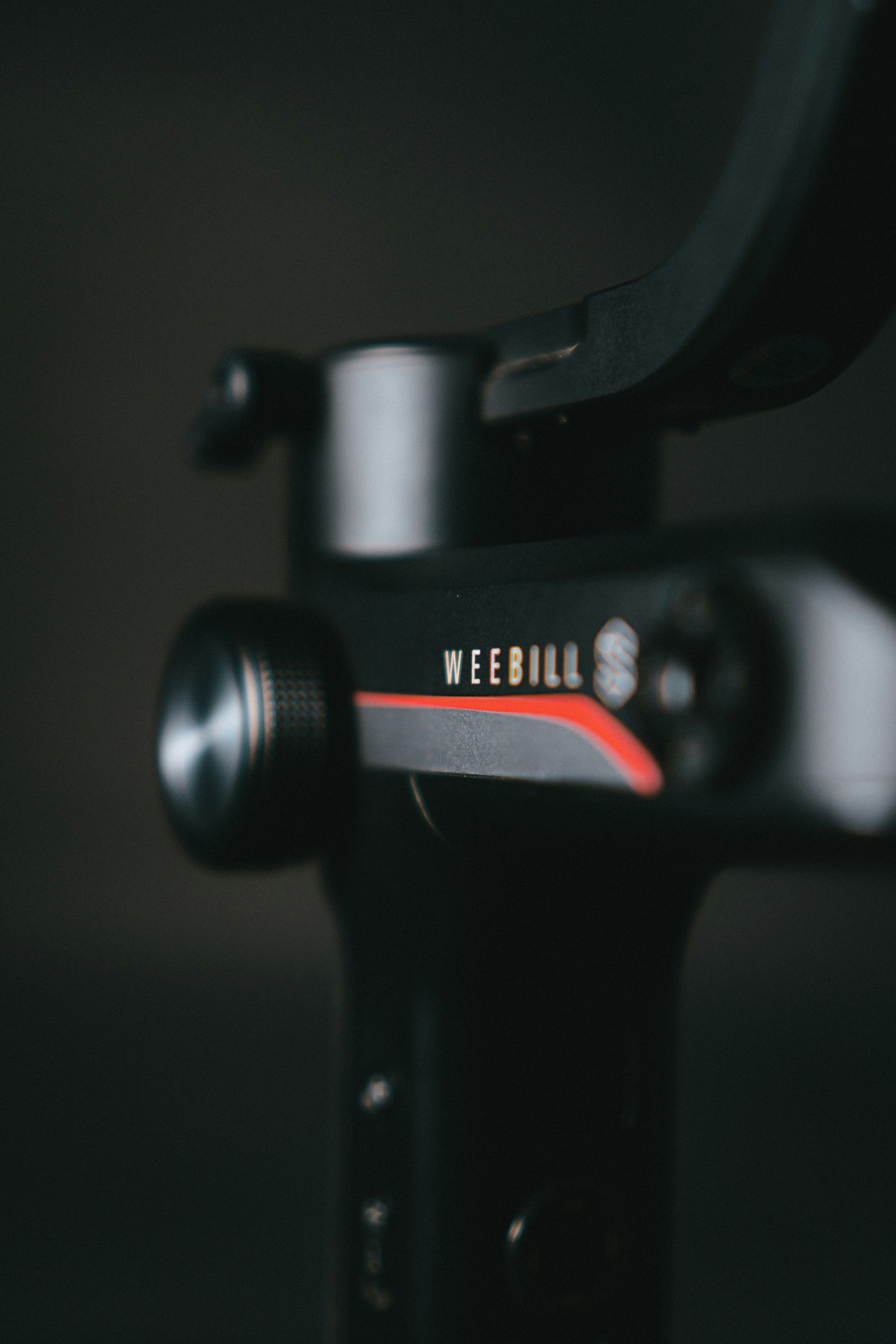 Close-Up on Weebill Gimbal Handle: Velvet Shadowed Branding and Precision Knurling