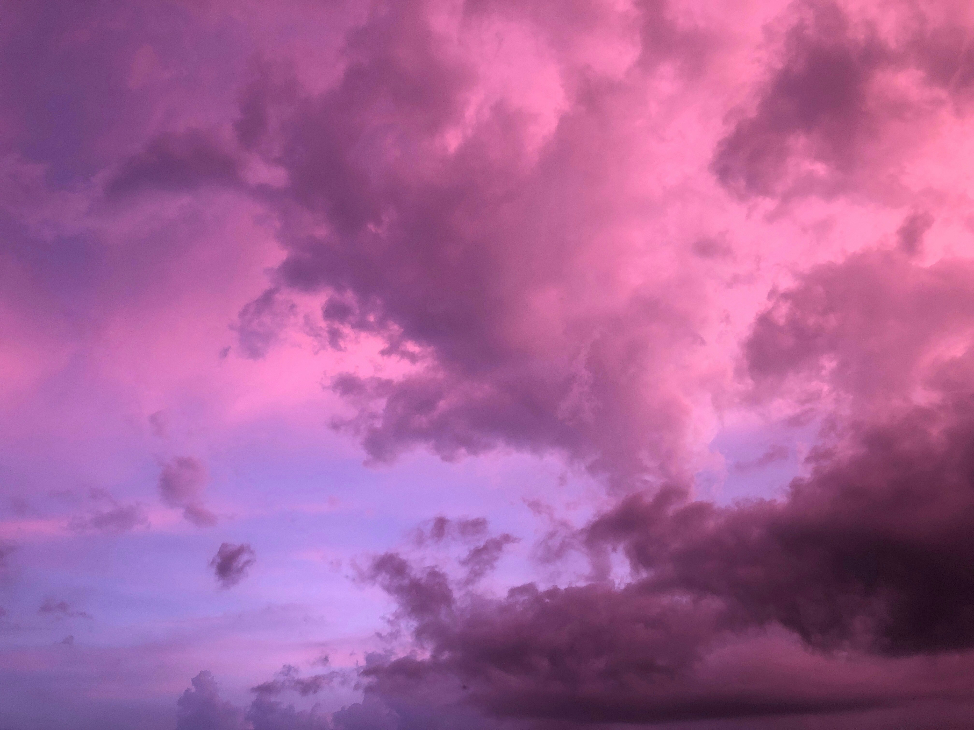Twilight Cloudscape: Violet-Pink Mists Sweep the Sky
