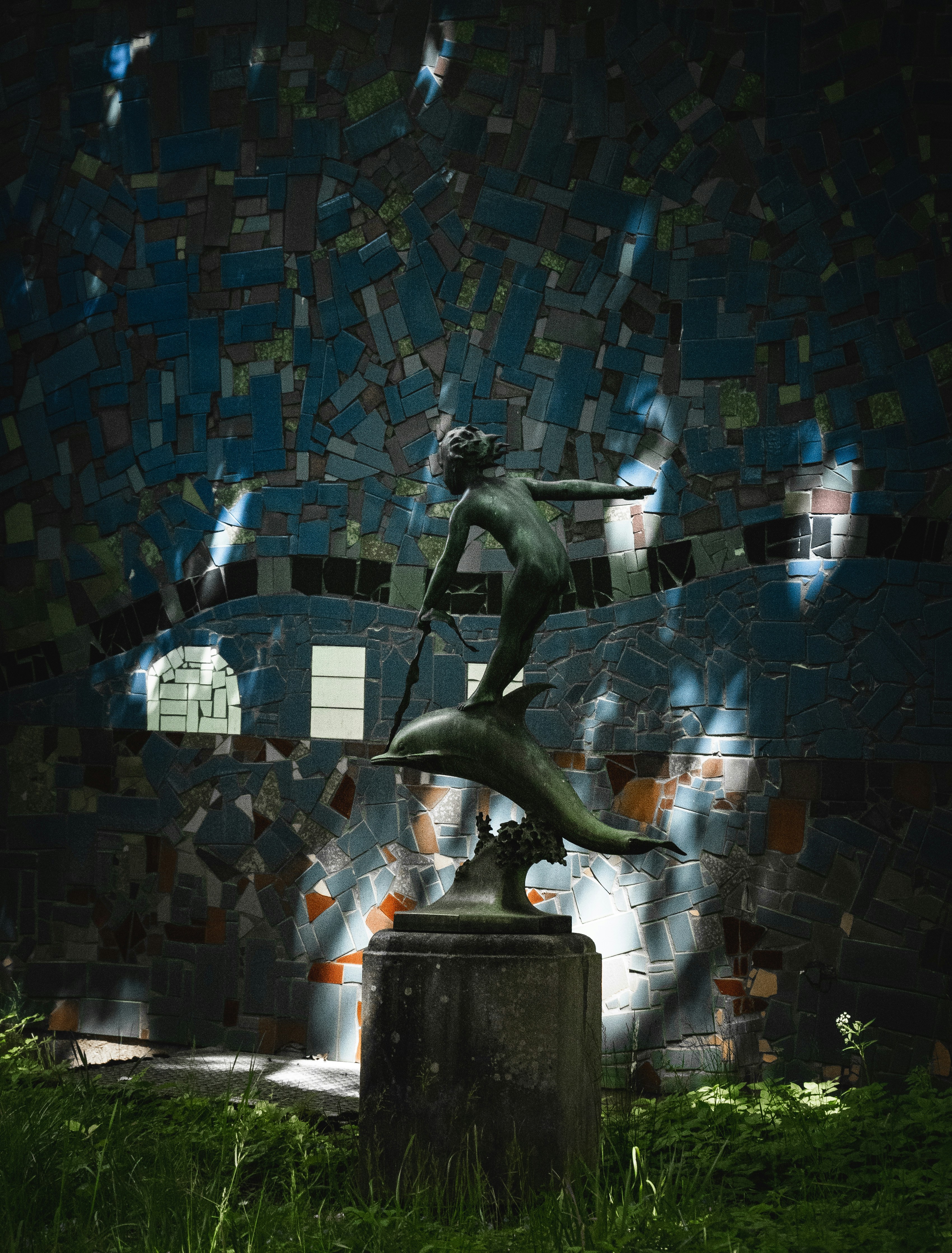 man and woman statue on water fountain