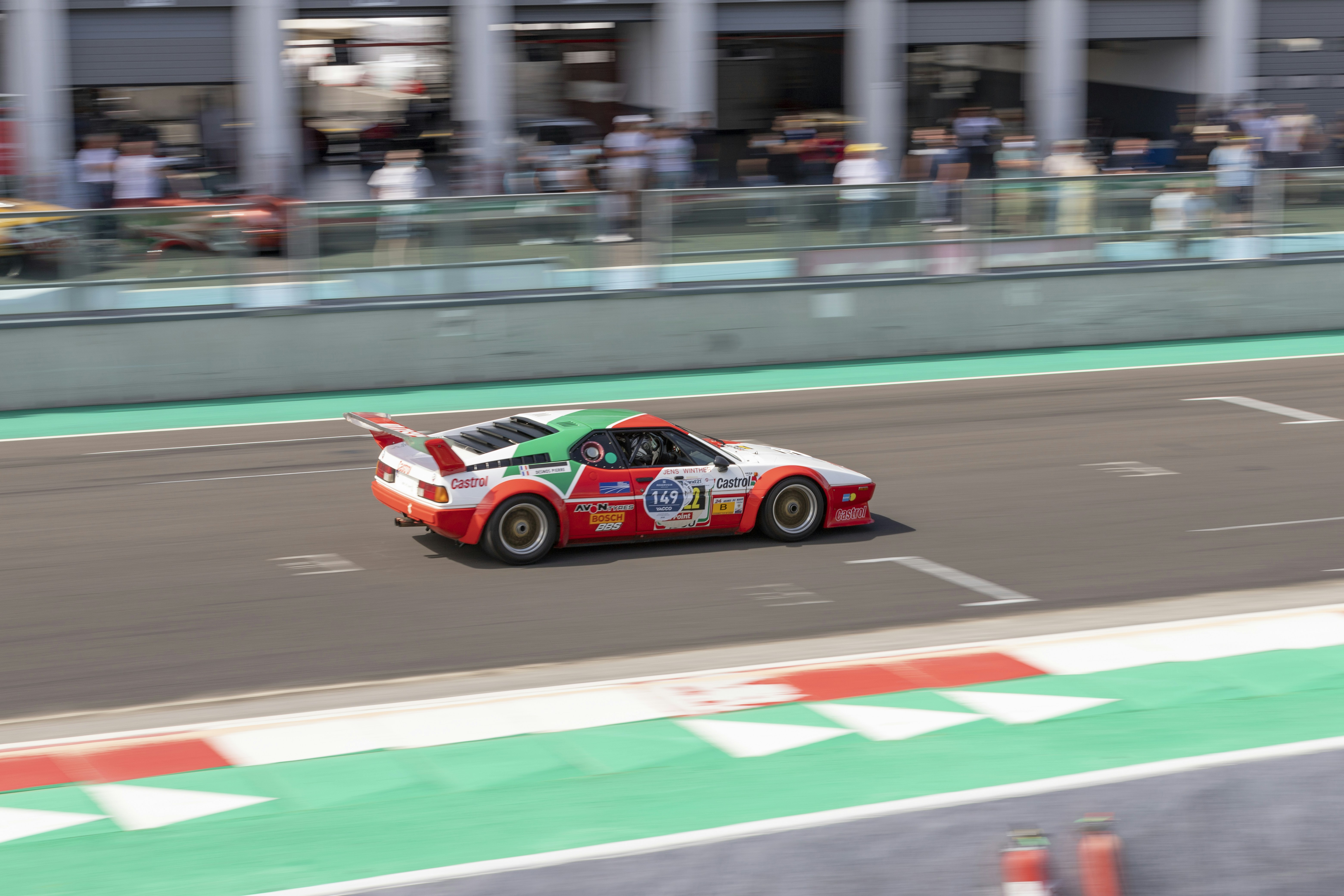 Red and black racing car on track photo – Free Magny-cours Image on ...