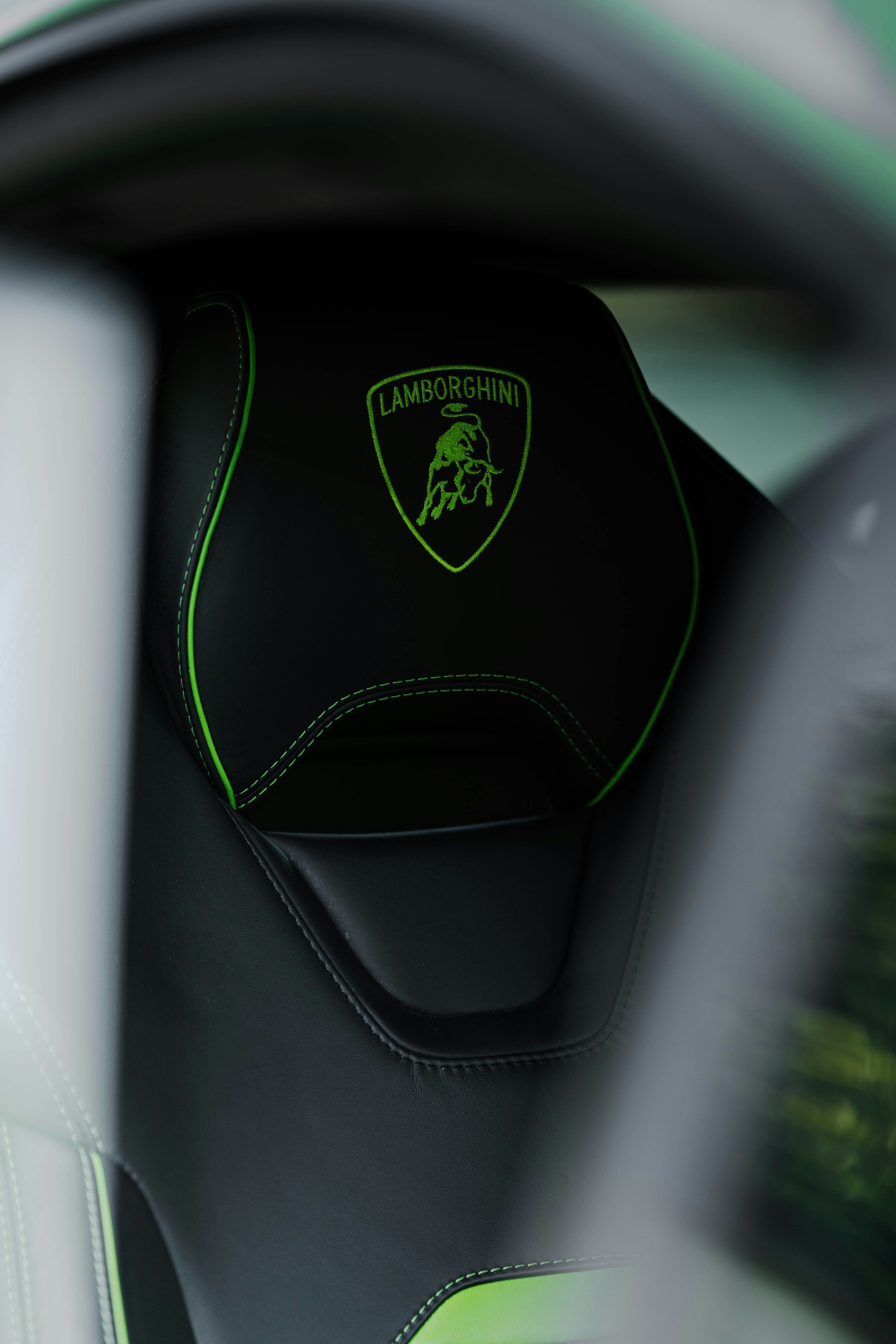 Lamborghini Lounging: Neon Stitch on a Car Seat