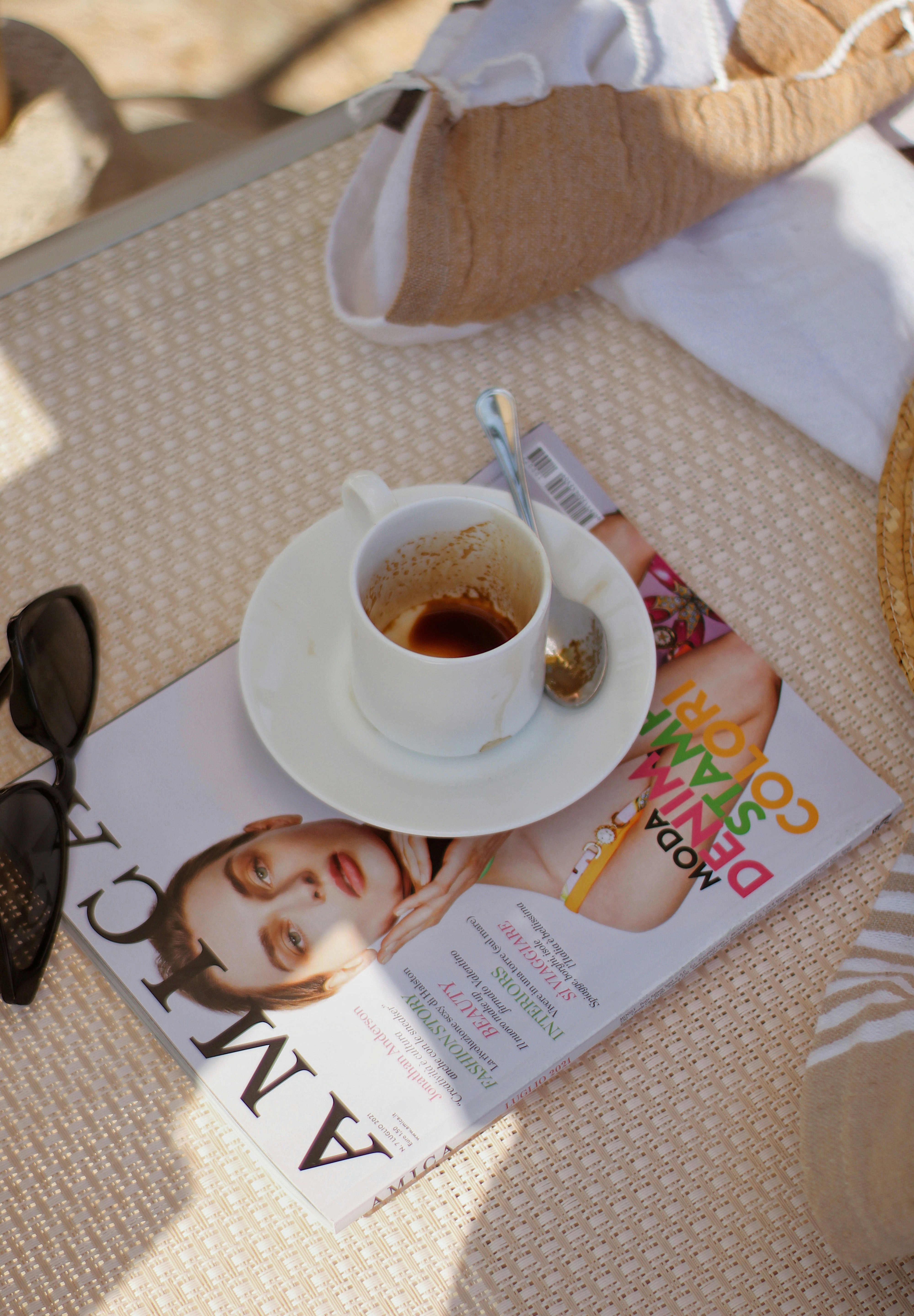 Espresso on a glossy page: a sunlit, chic picnic moment