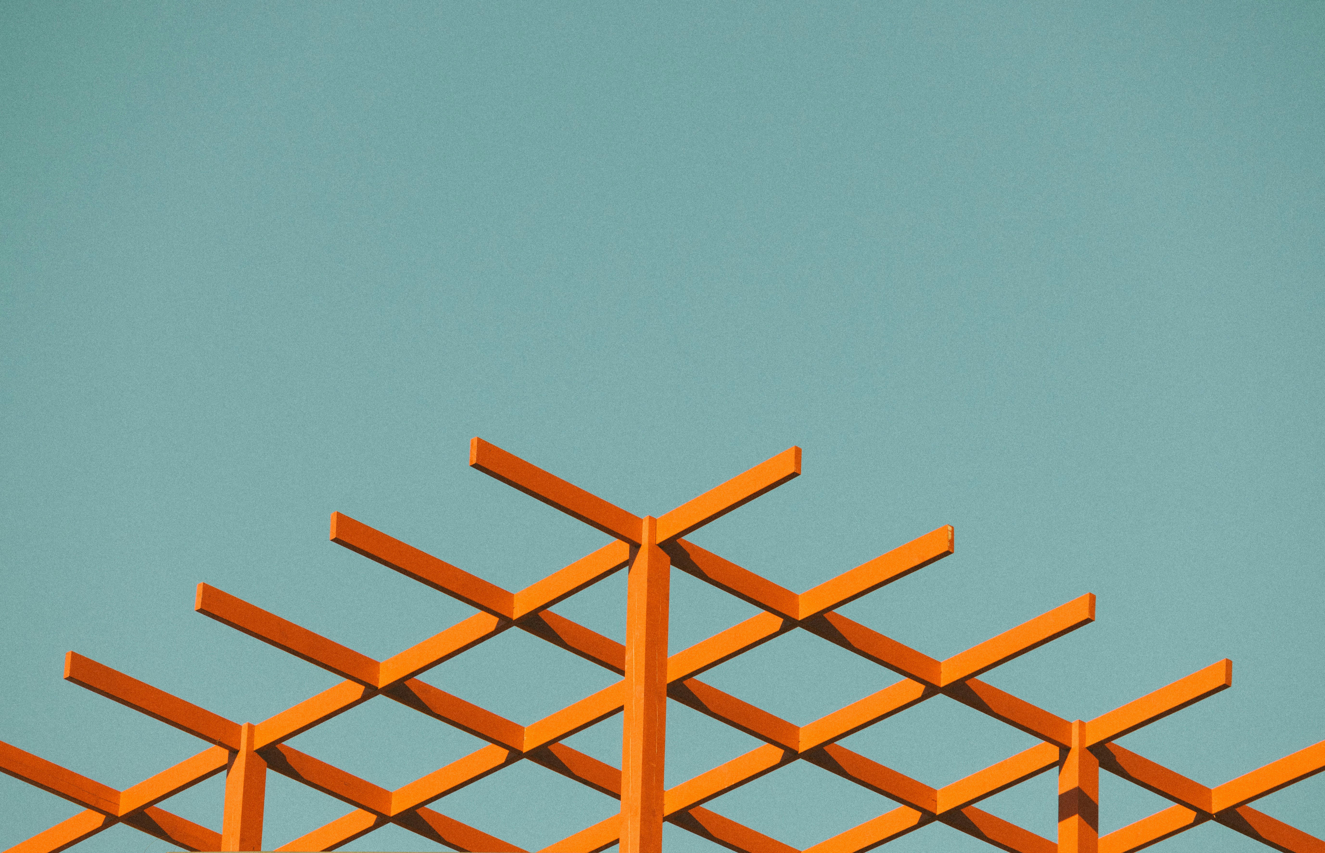 Orange metal frame under blue sky during daytime photo – Free Symbol ...