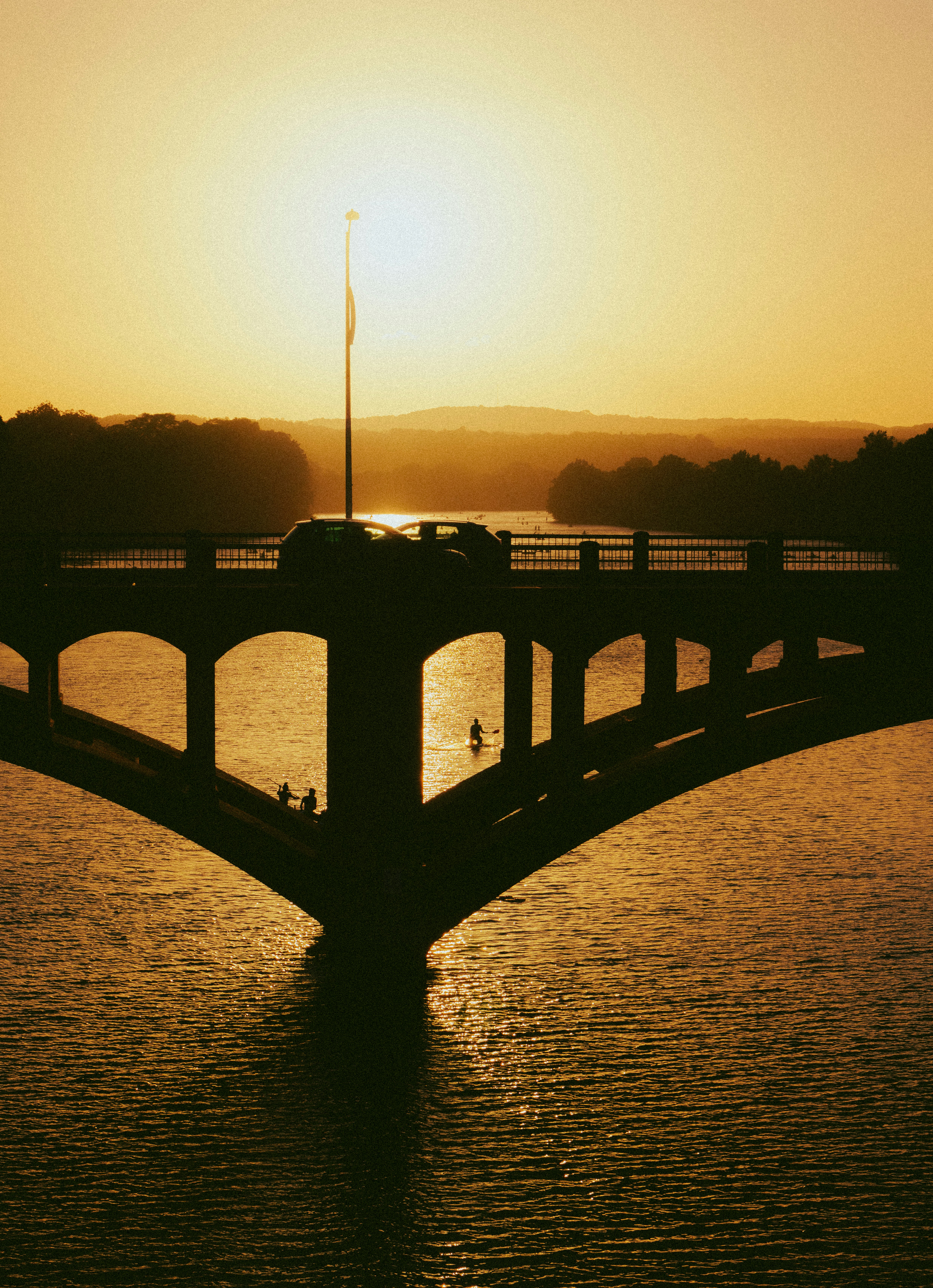 lone kayaker in the Colorado River, Austin