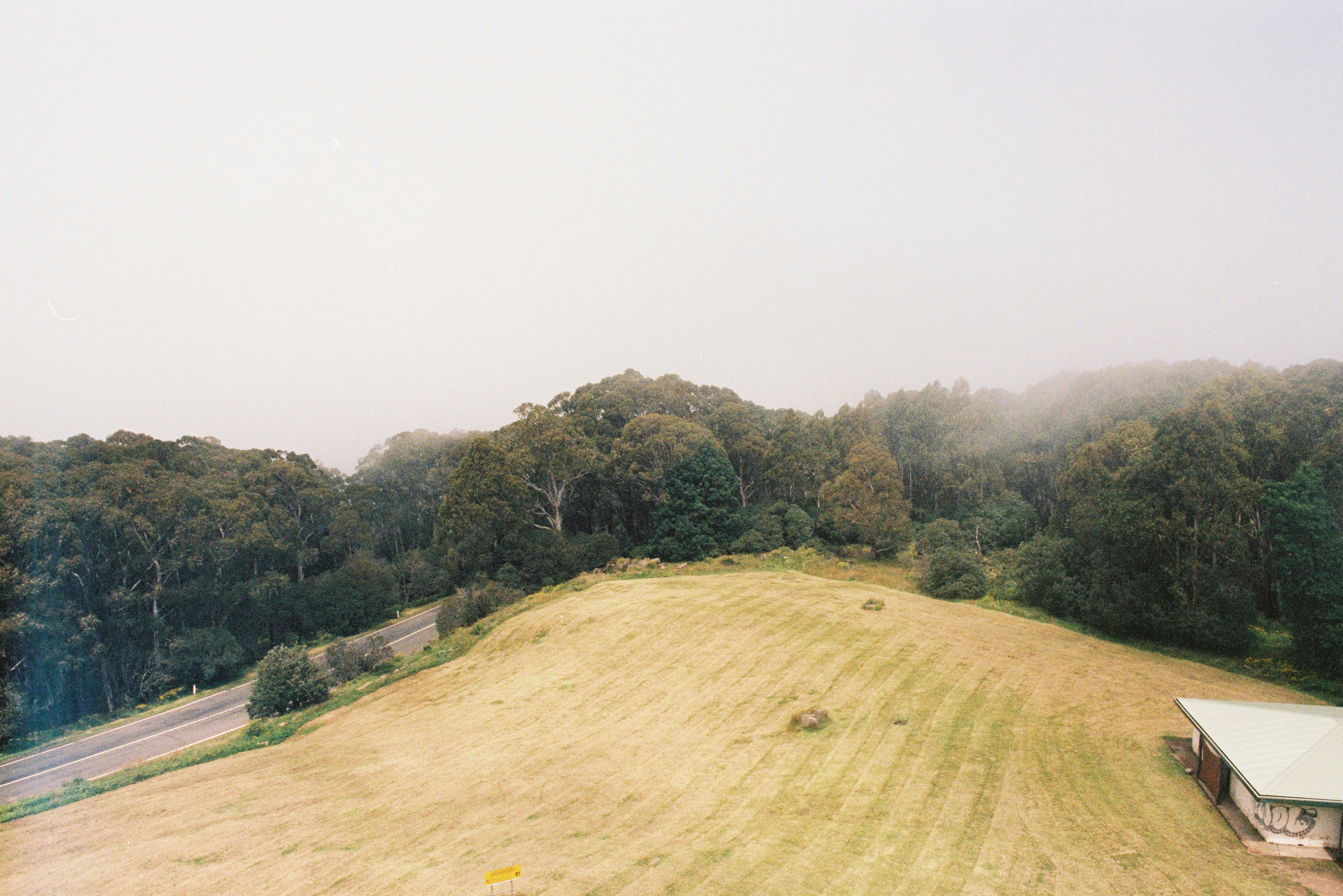 Morning Mist Over Rolling Fields