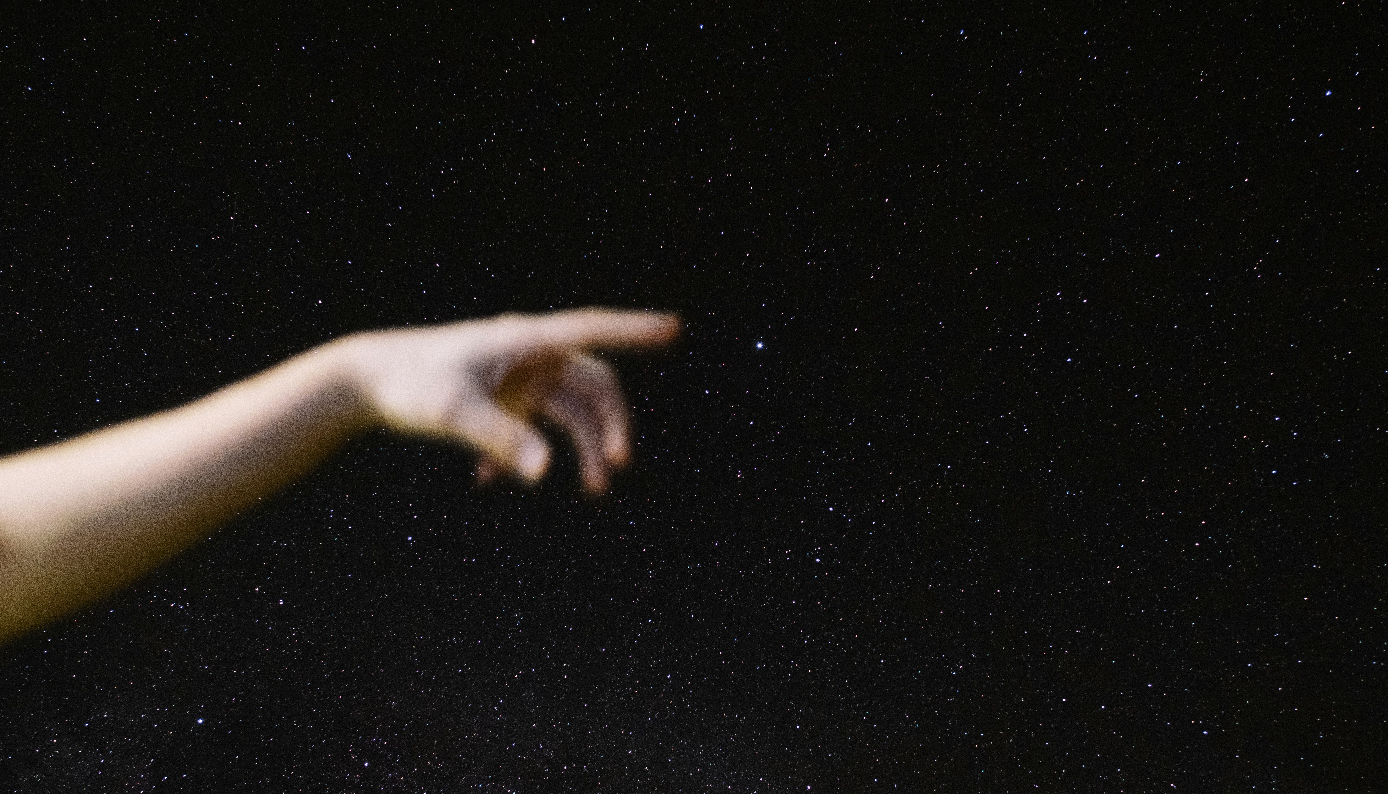 Hand Reaching For The Stars