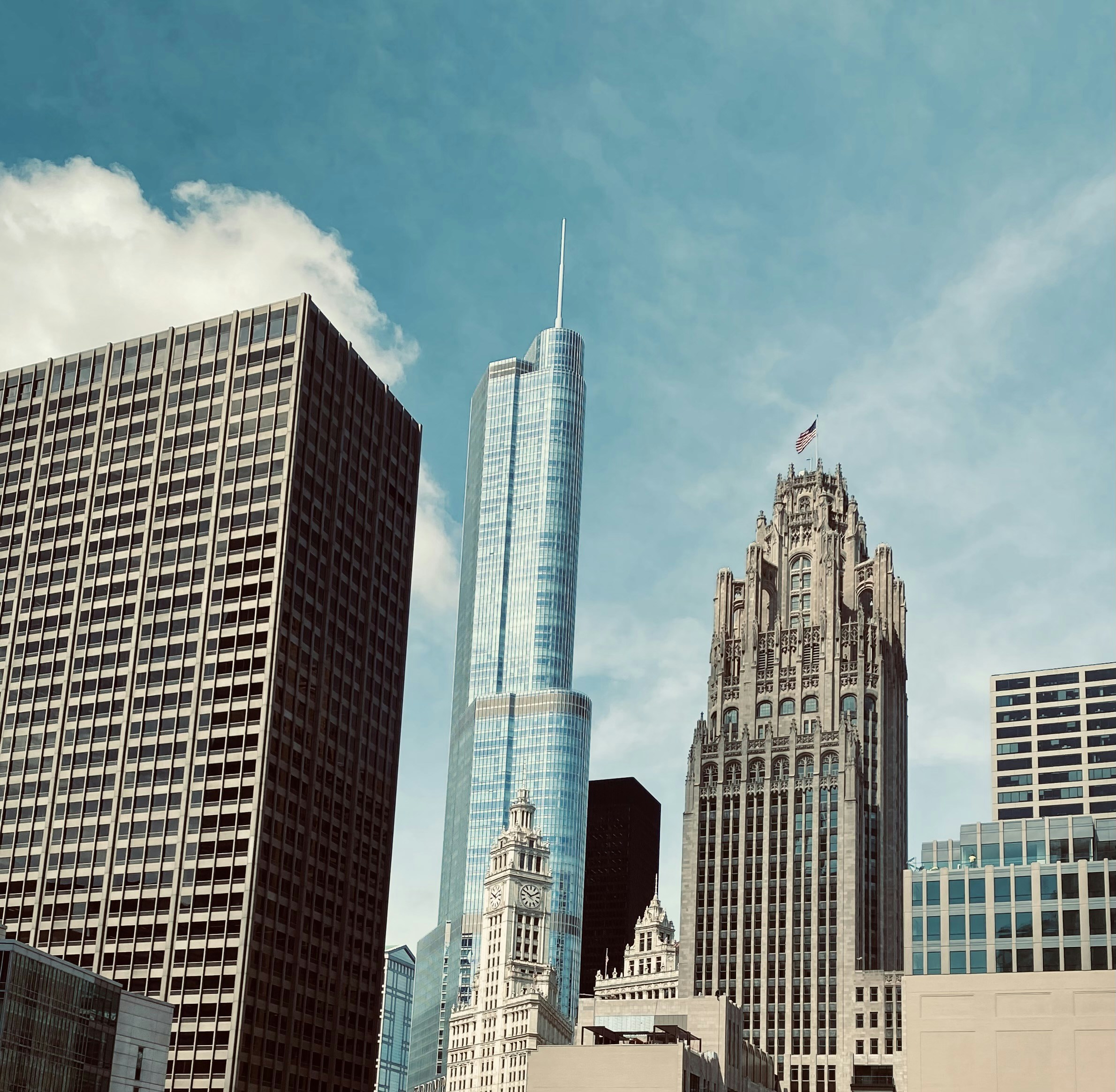 White and gray high rise buildings under blue sky during daytime photo ...