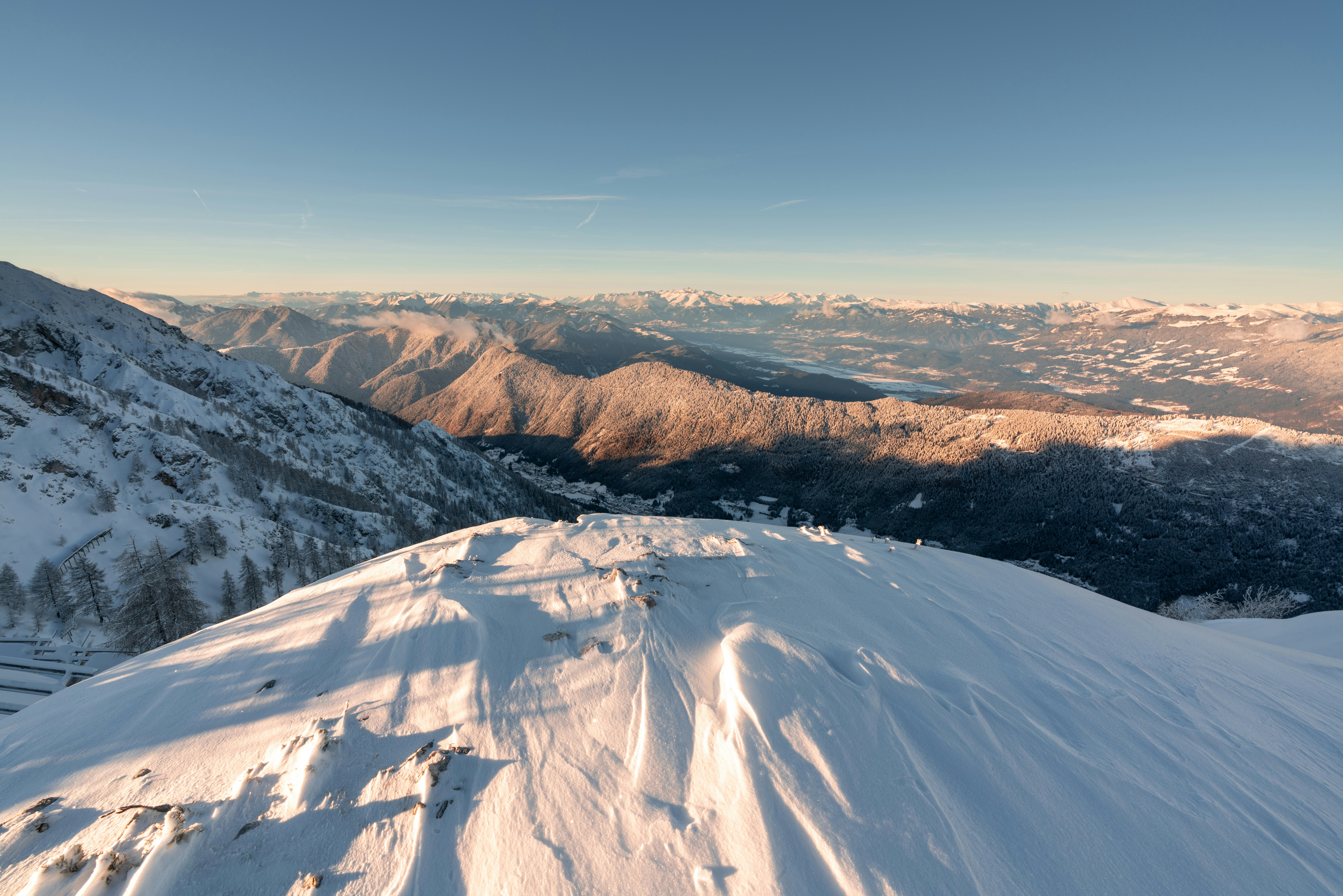 Golden afternoon light over the magical winter landscape of Dobratsch Natural Park, Villach, Carinthia, Austria