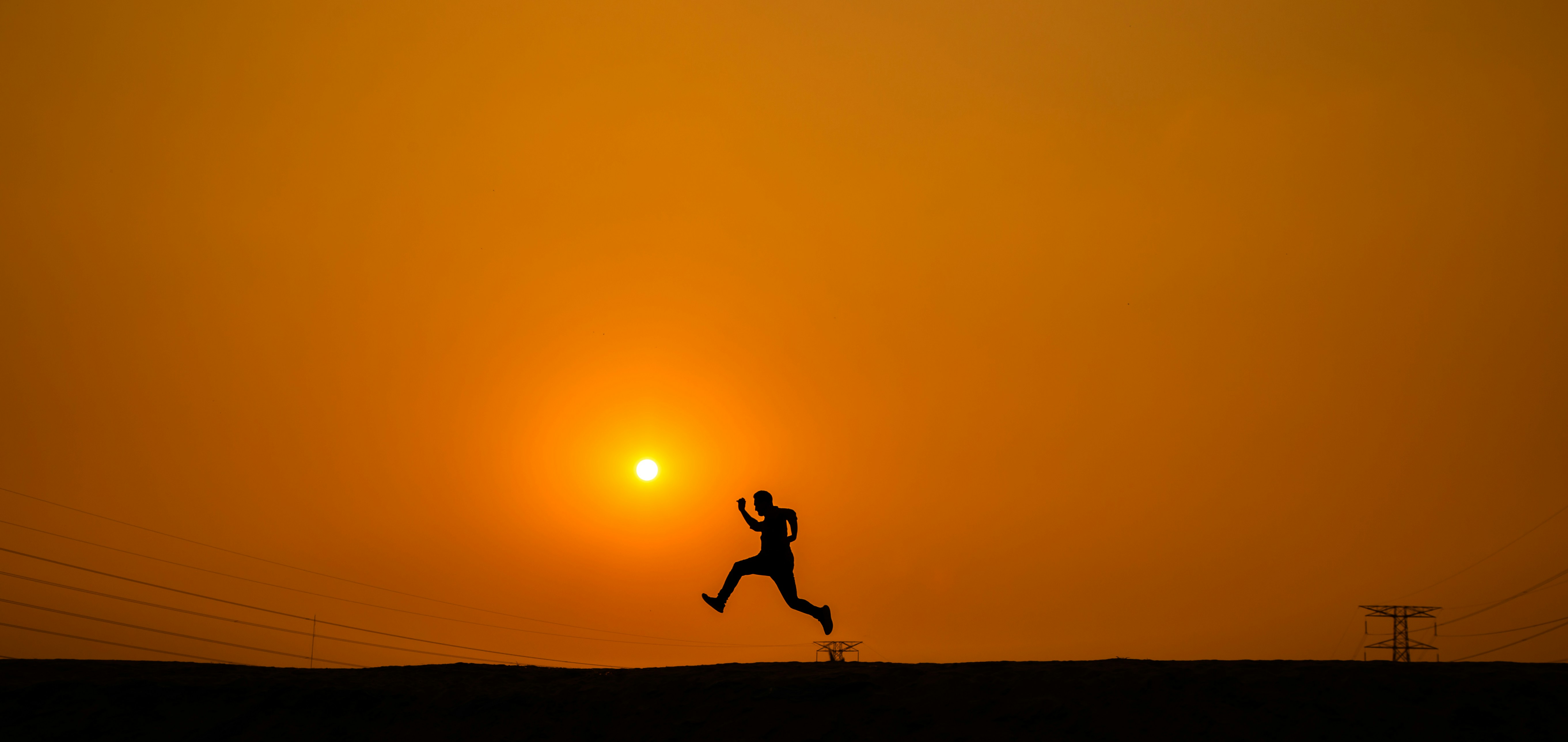 Woman Running Sunset