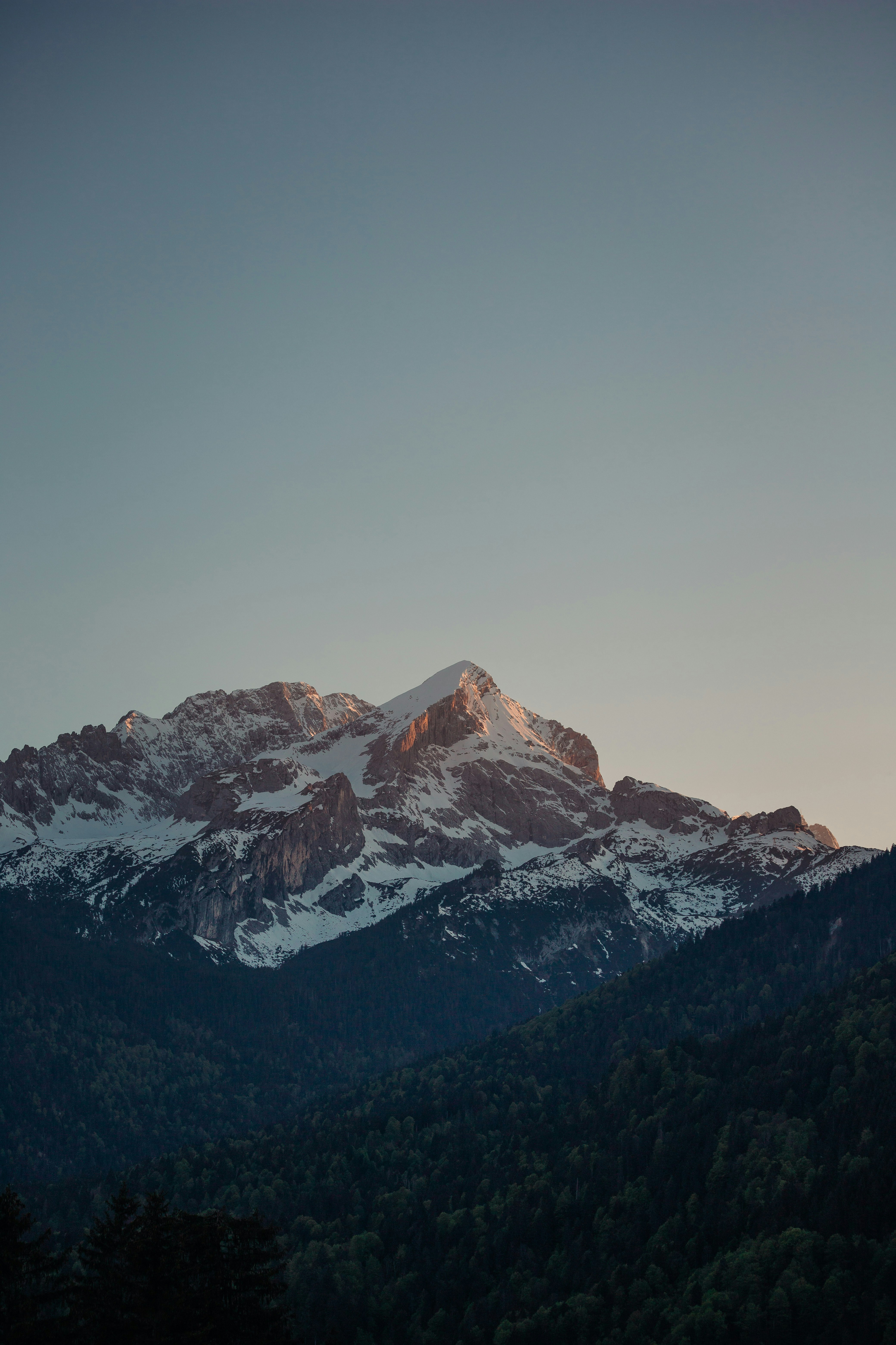 alpen in bavaria, germany | snow covered mountain under blue sky during daytime