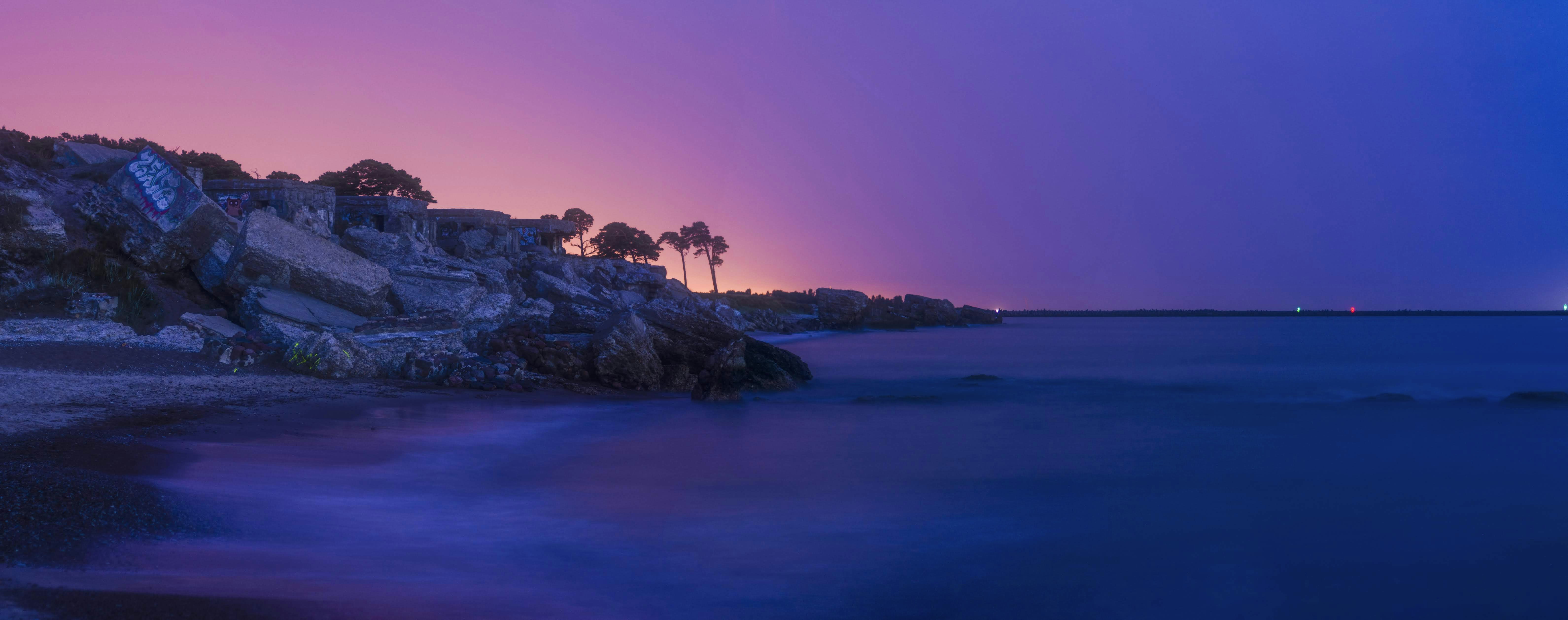 Twilight Tide Against the Coastal Cliff
