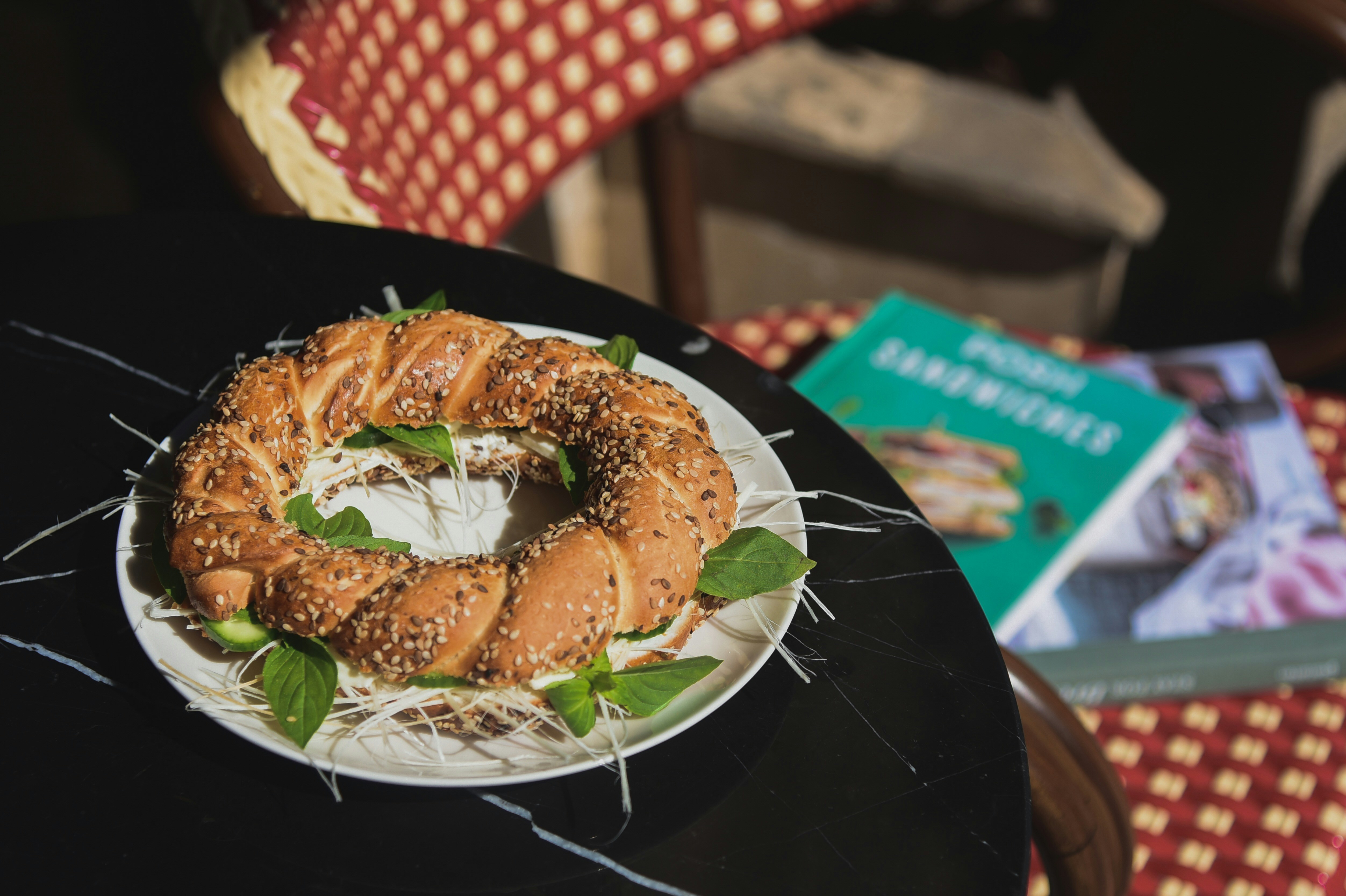 Sunlit Cafe Delight with Simit and Books
