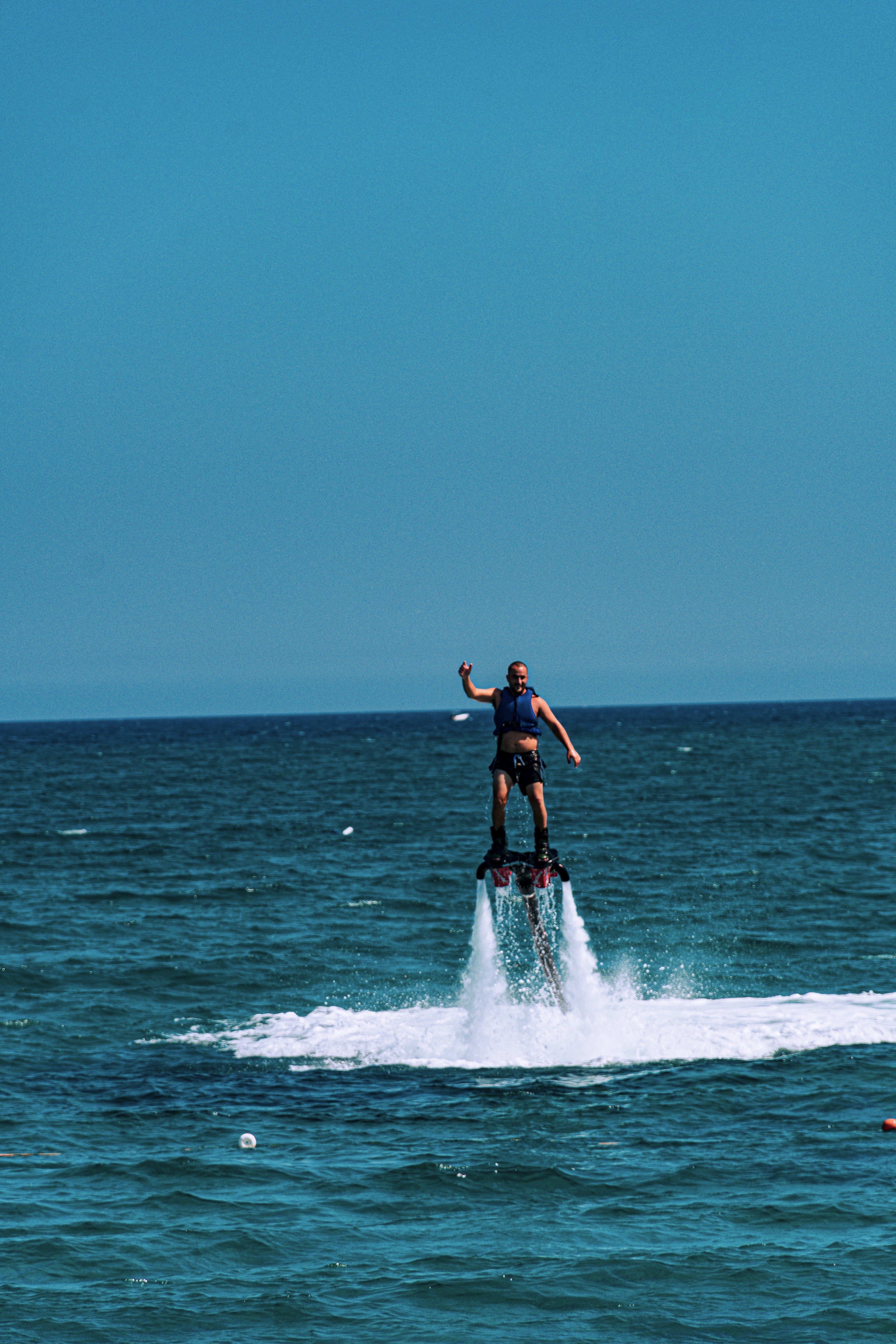 Hydrofoil Hero: A Rider Lifts Above the Blue Expanse