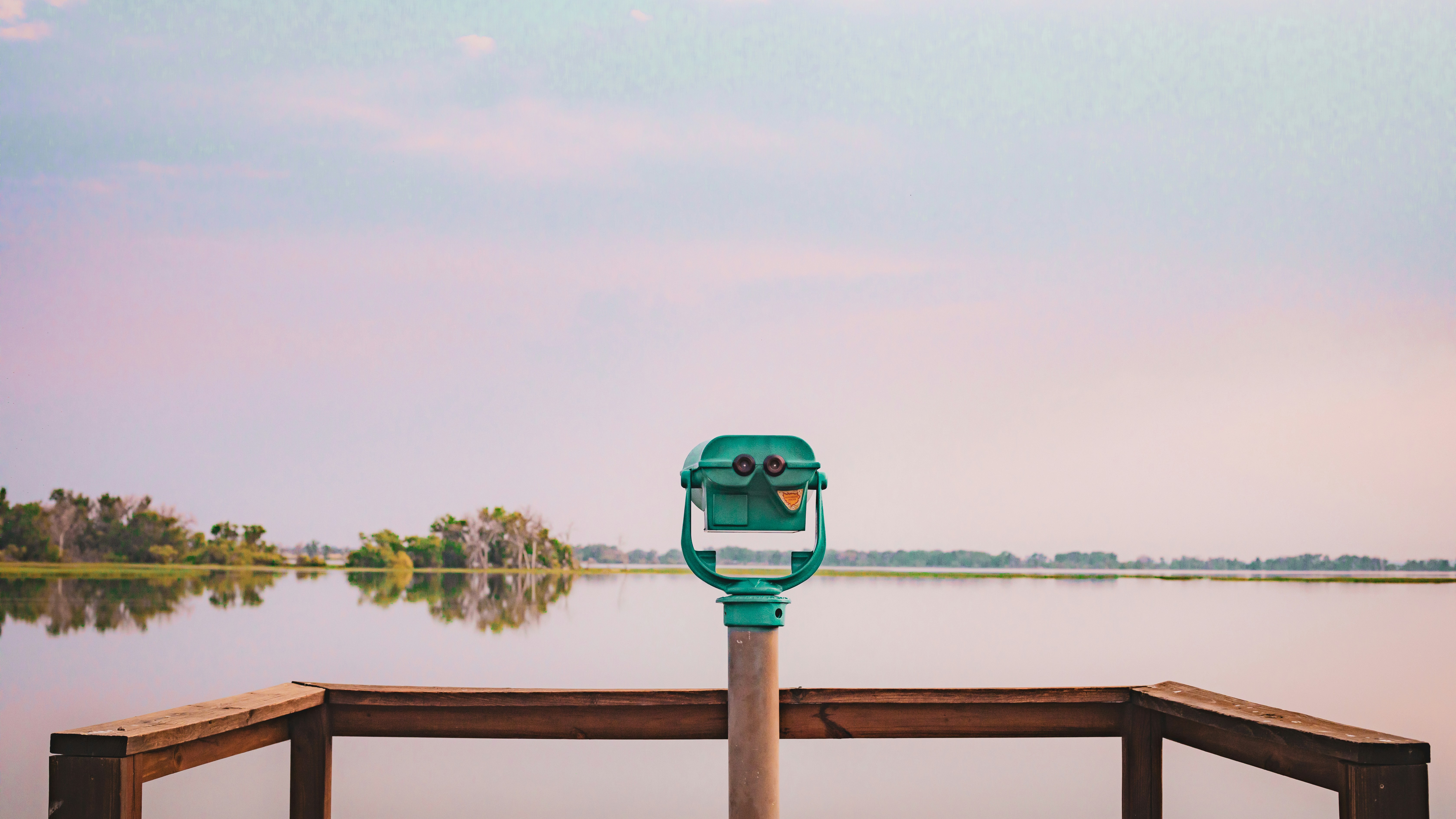  lookout telescope on the pier at golden hour