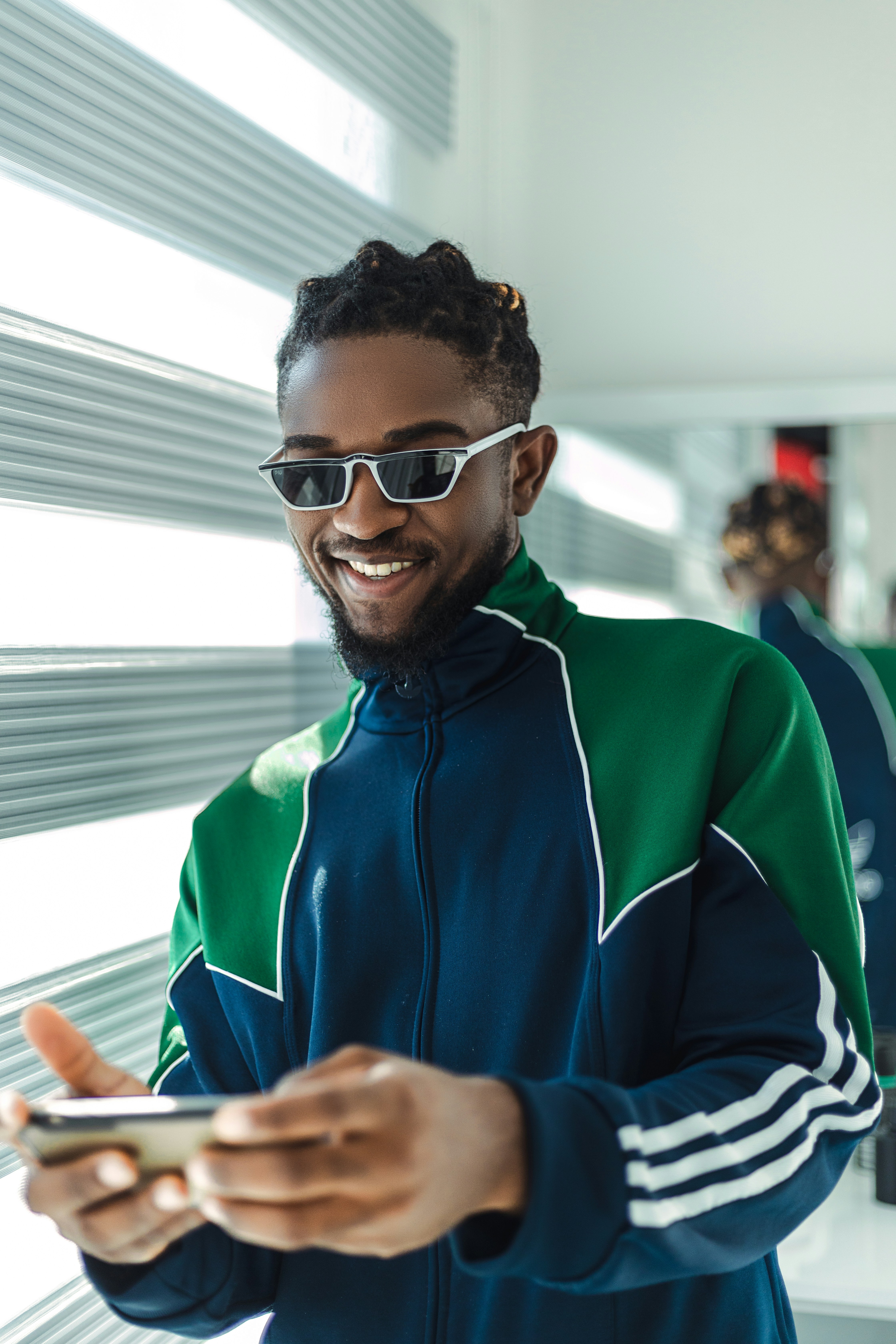 Chromed Corridor Confidence: A Smile in Bold Green and Navy