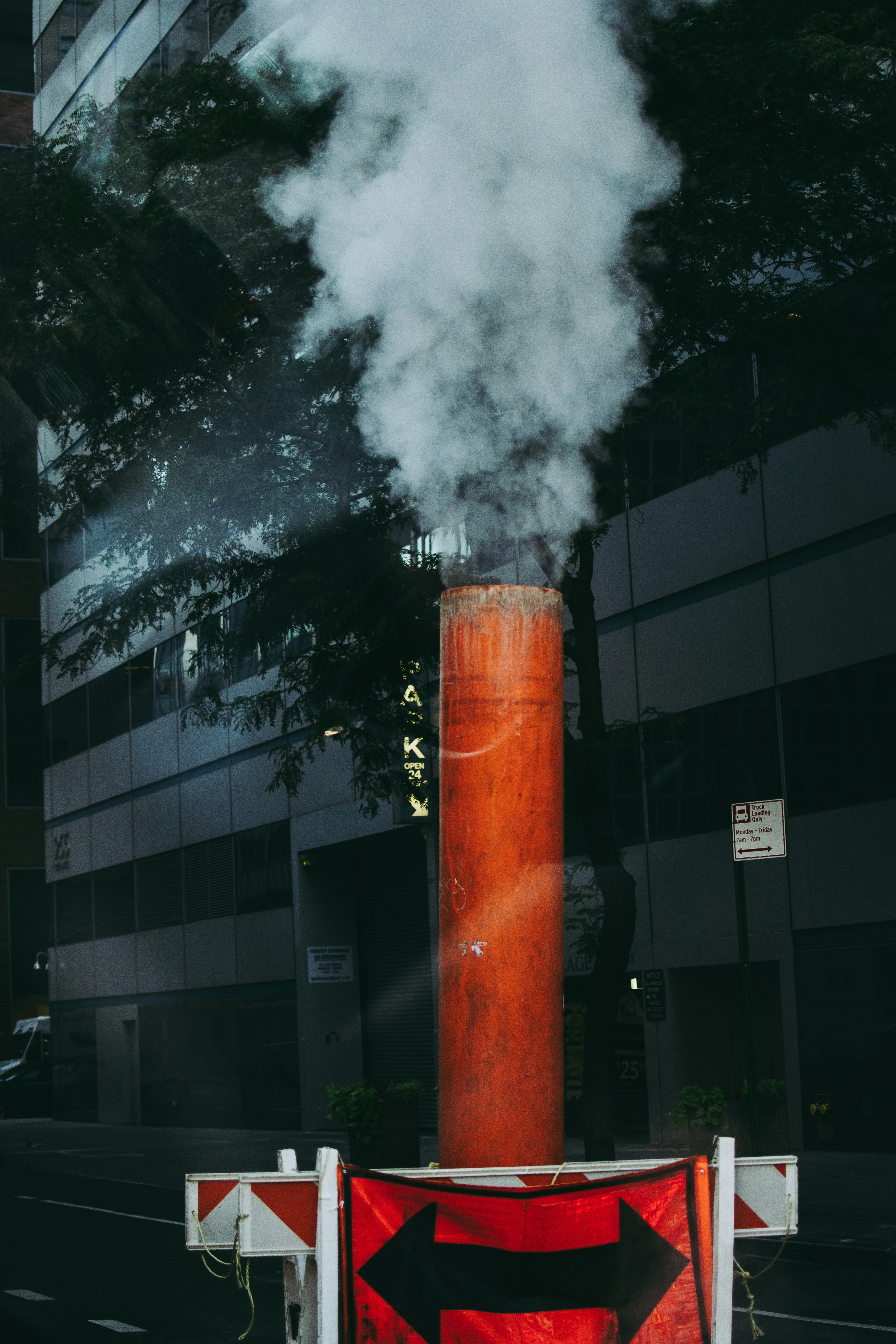 orange and black fire near building