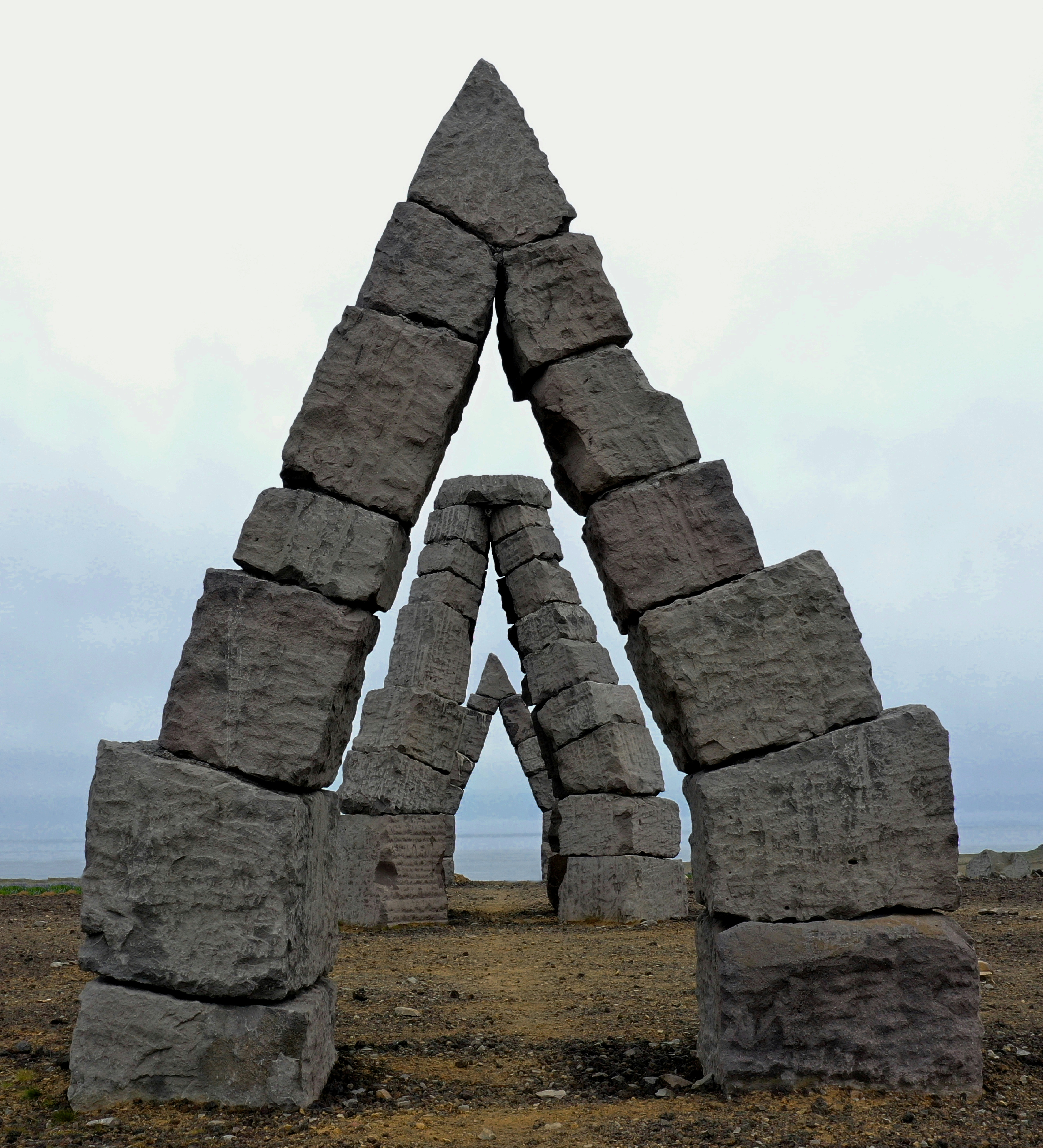 Converging Stone Arches: A Corridor of Weathered Monoliths