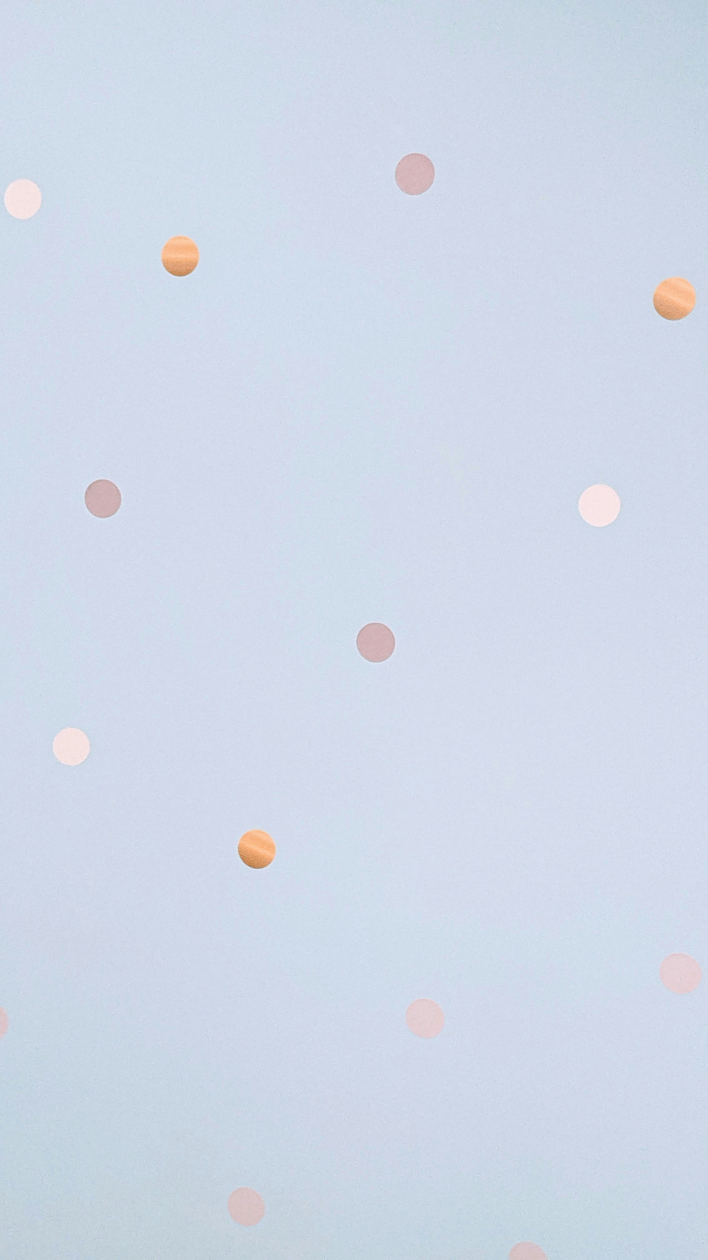 Floating Pastel Dots on a Calm Blue Canvas