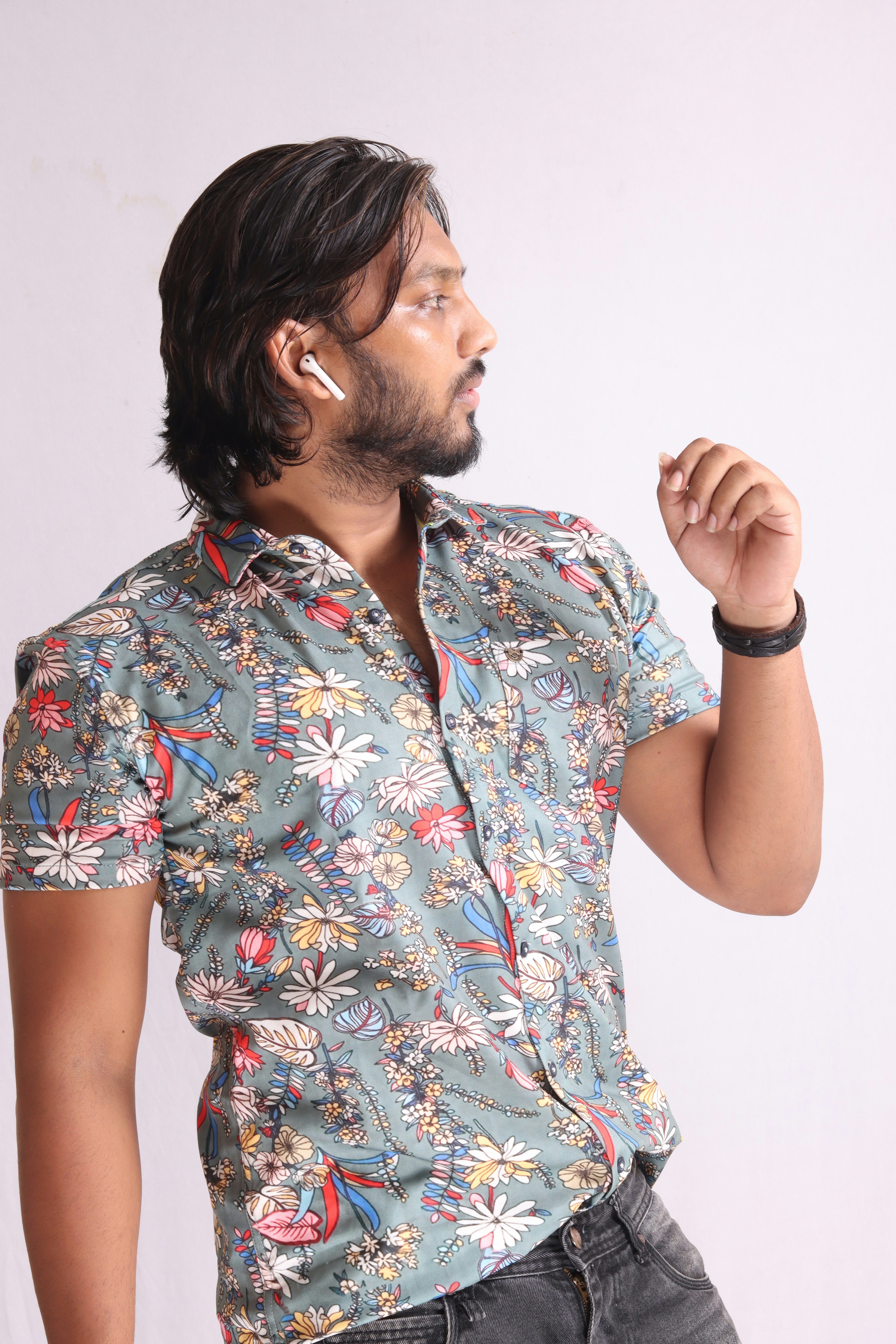 Floral Breeze: Portrait in Mid-Gesture with AirPods