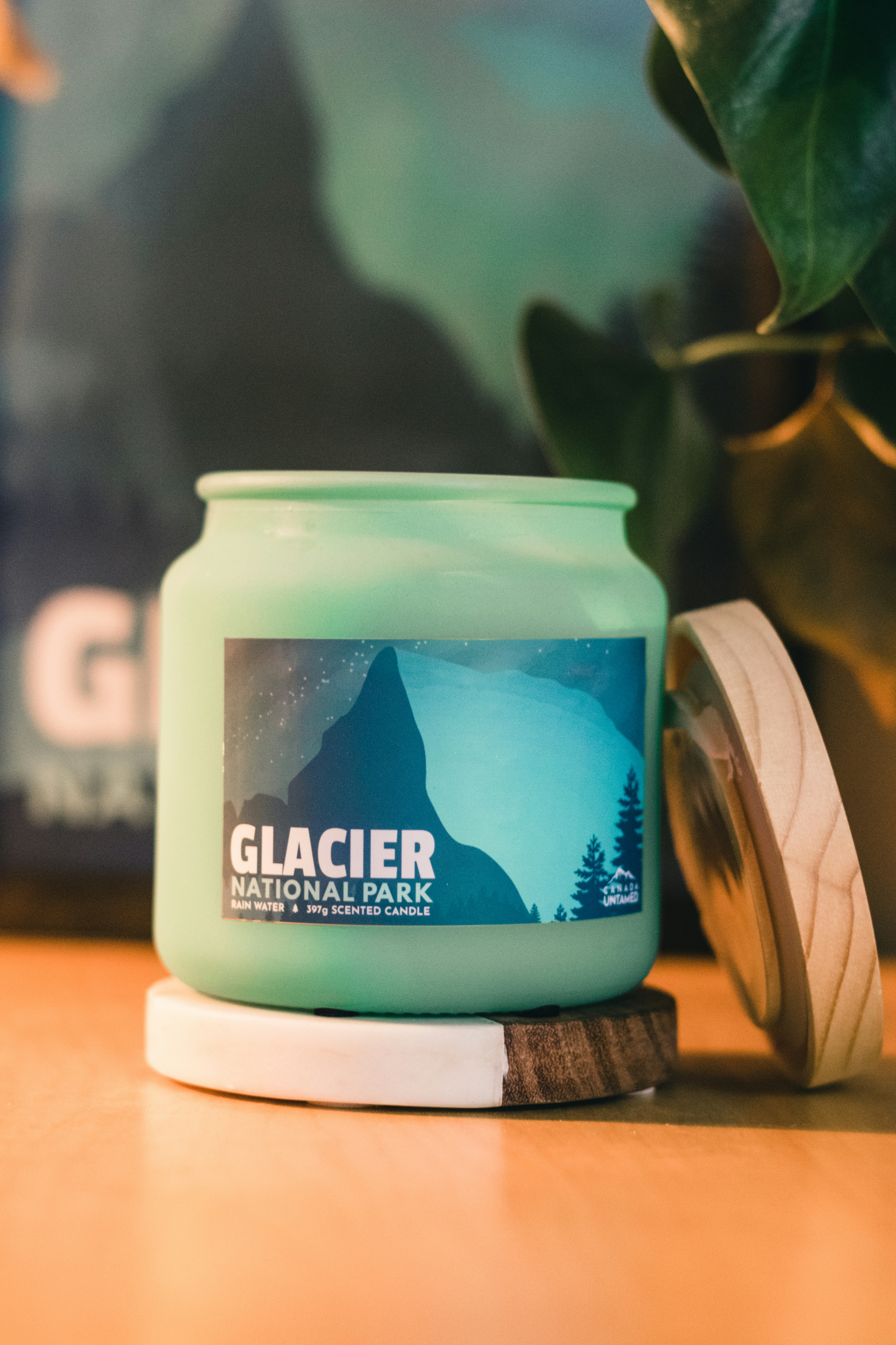 Glacier Glow: Mint Candle on a Wooden Coaster
